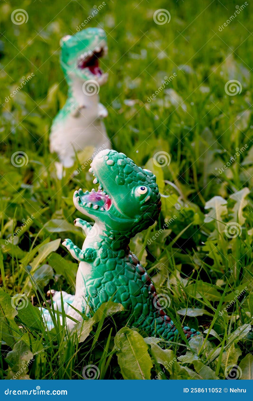 Plastic Dinosaur Toy Pictured at a Backyard Stock Photo - Image of dino ...
