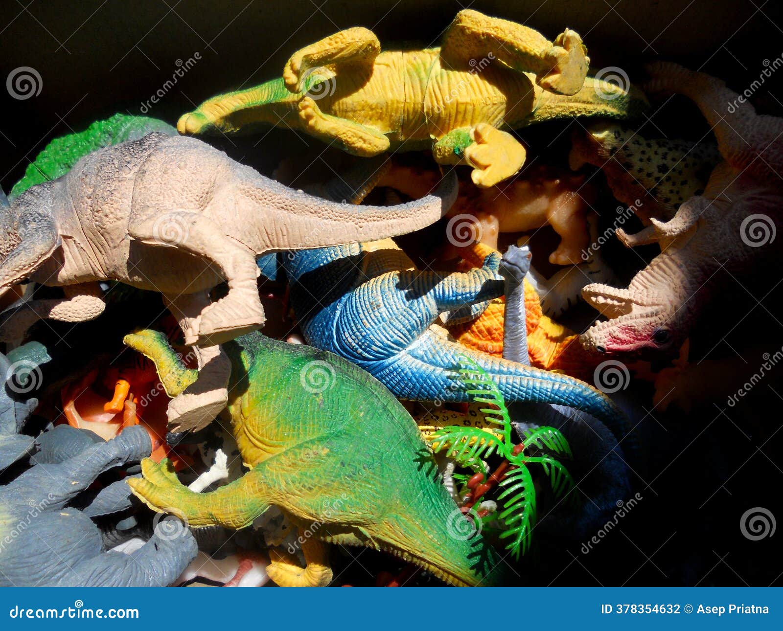 Plastic Dinosaur On Pebble Stone Royalty-Free Stock Image ...