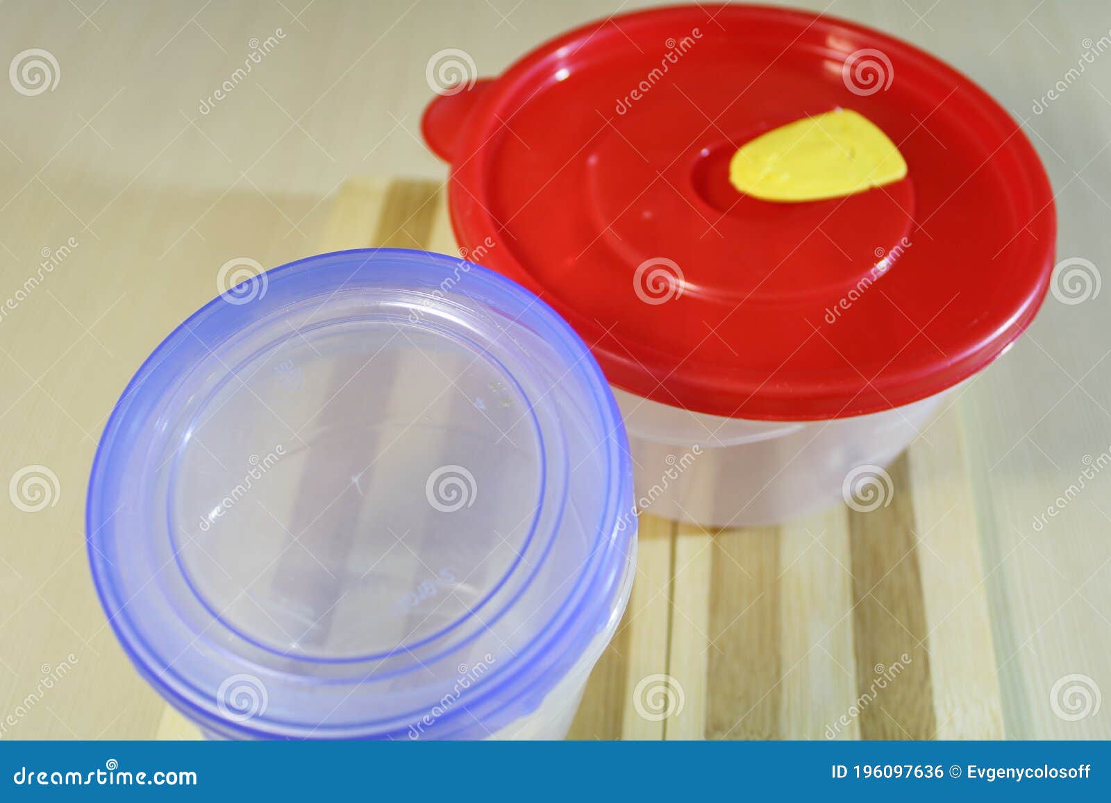 Plastic Dishes on a Wooden Table. Stock Photo - Image of wood, food ...