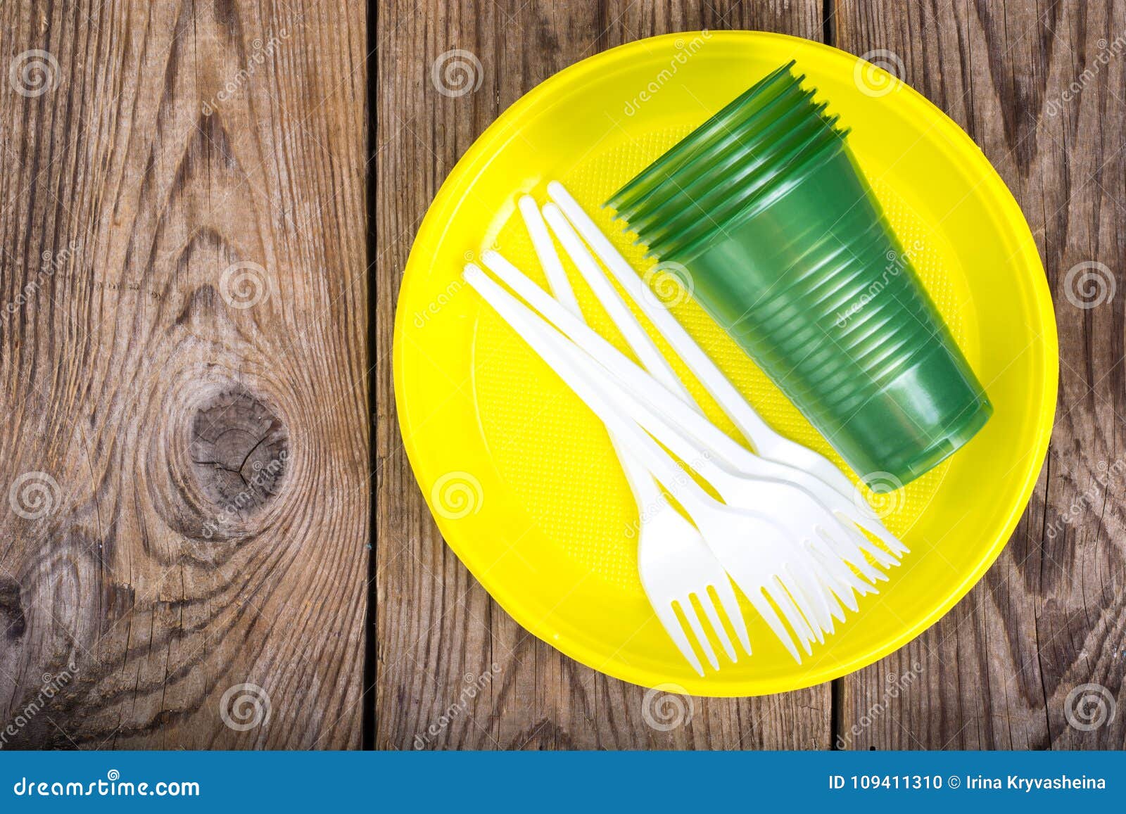 Plastic Disposable Tableware on Wooden Table Stock Photo - Image of ...