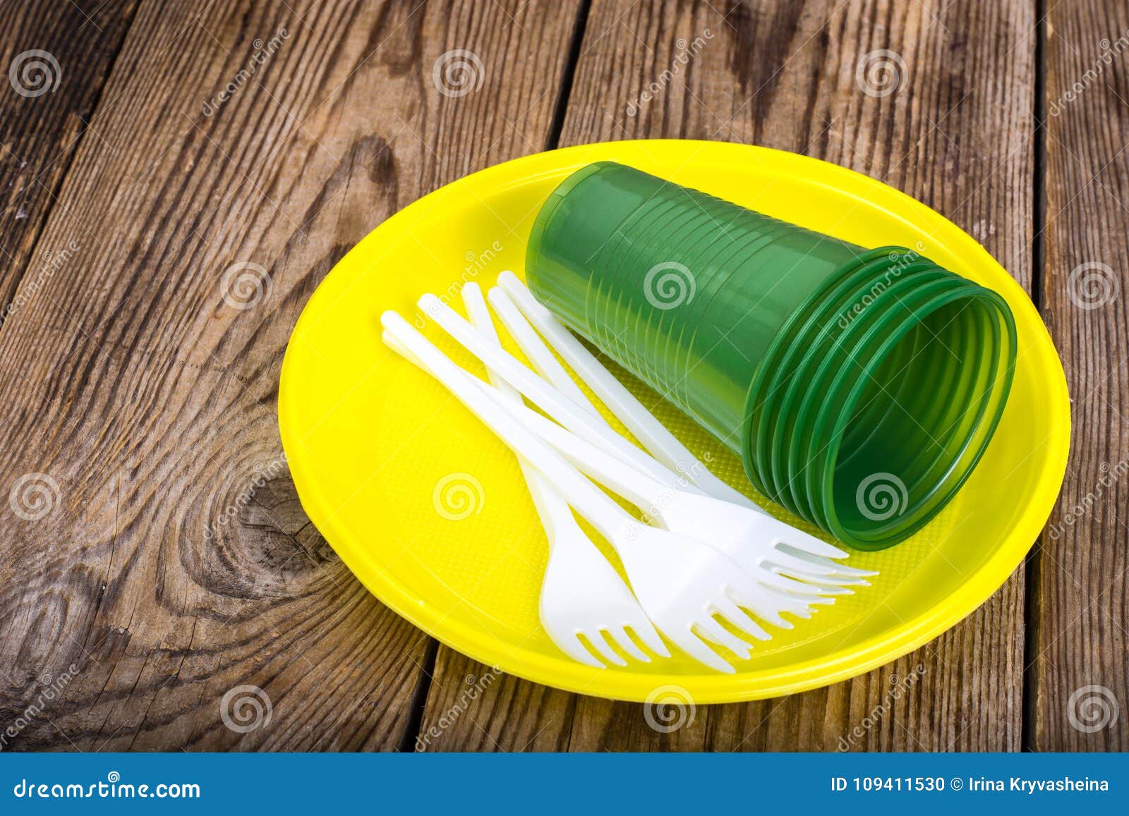 Plastic Disposable Tableware on Wooden Table Stock Photo - Image of ...