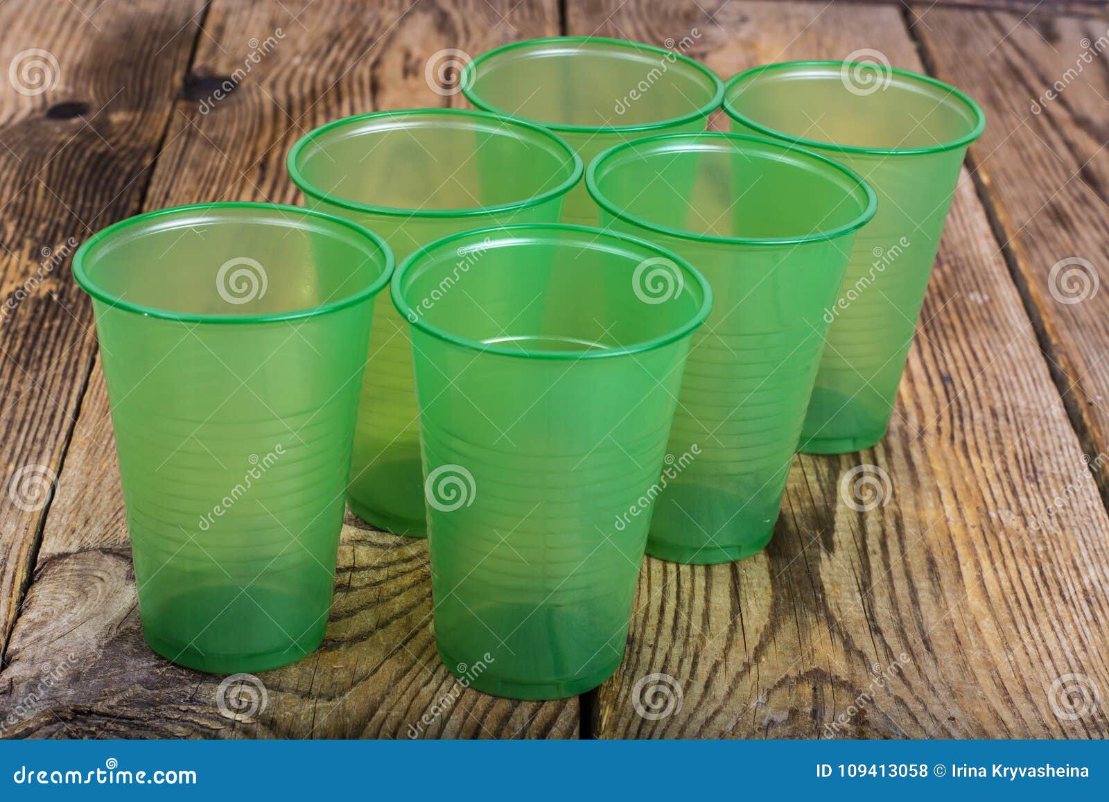 Plastic Disposable Tableware on Wooden Table Stock Photo - Image of ...