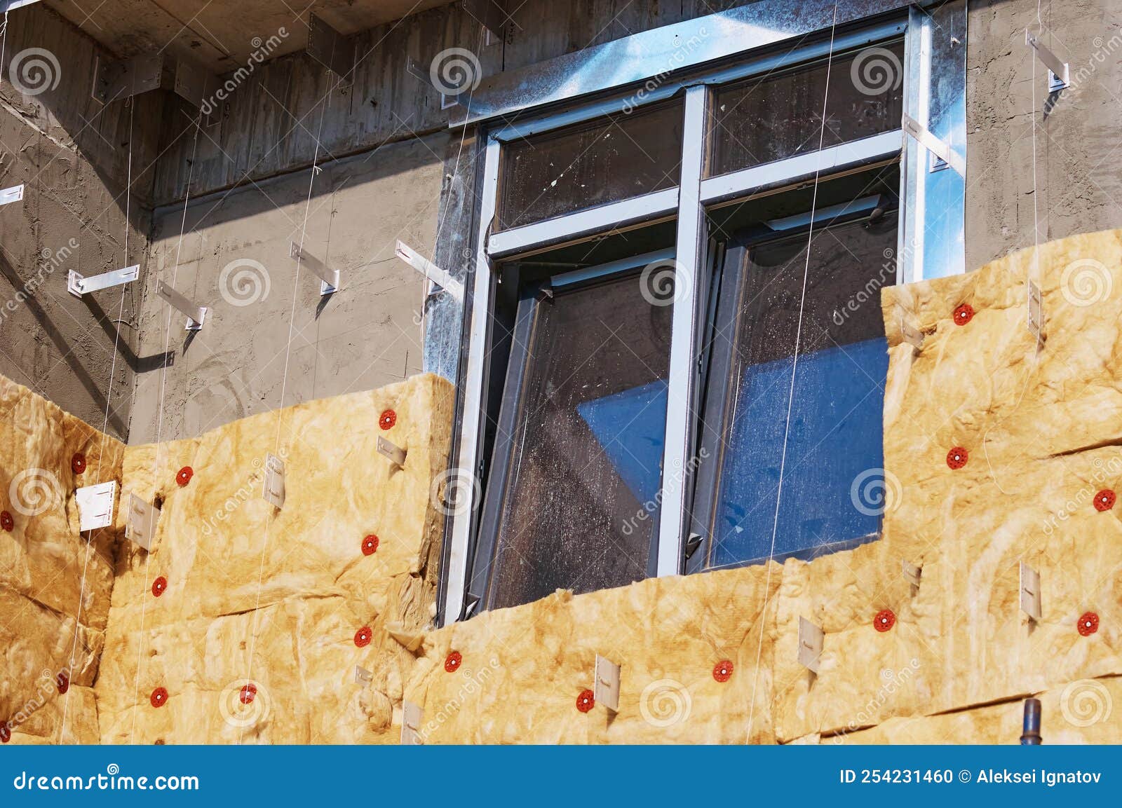 Plastic Double Glazing in a New House. Insulation of the Facade of a ...