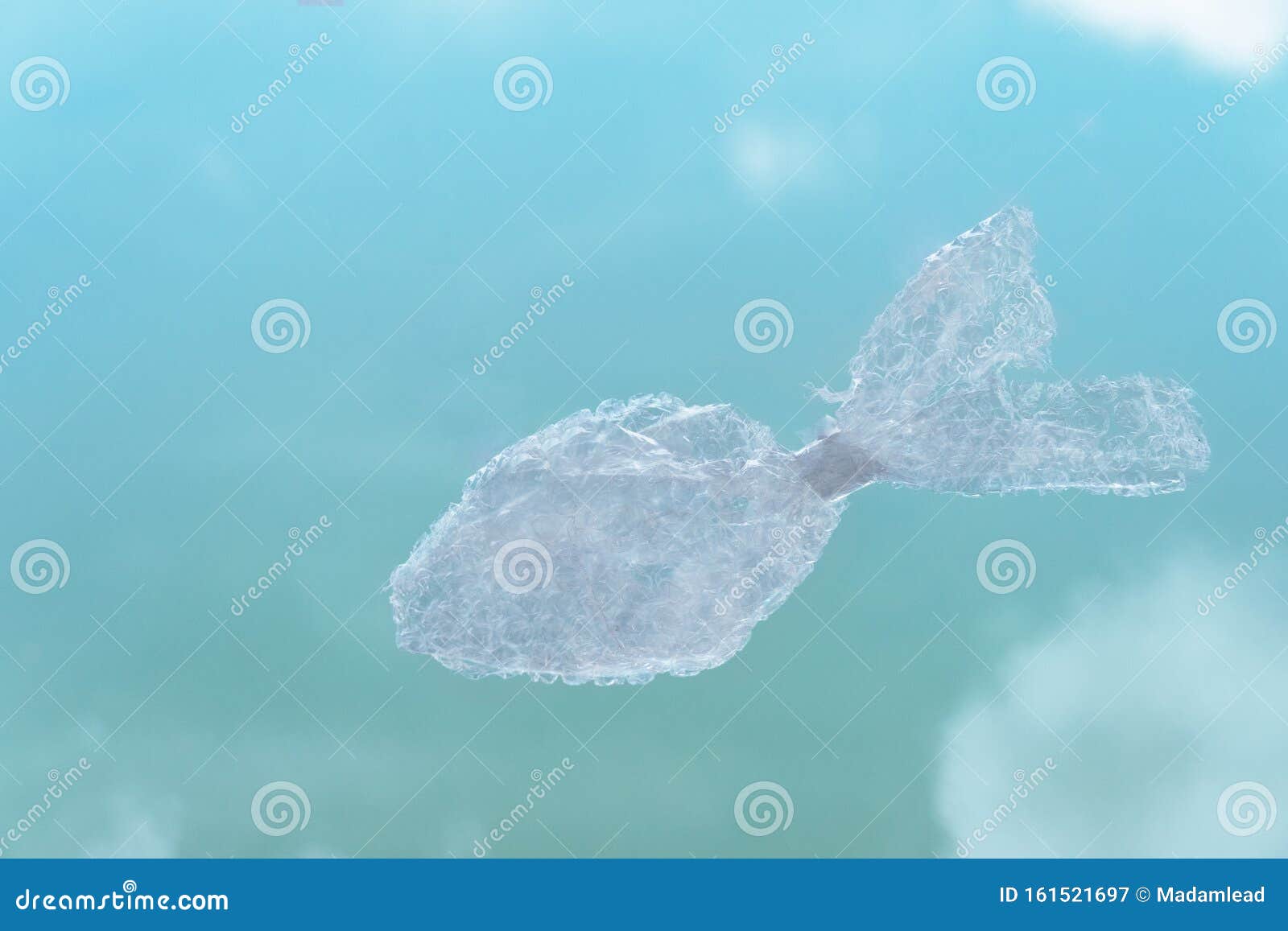Plastic Fish from Garbage with Blue Water Background in Environmental ...