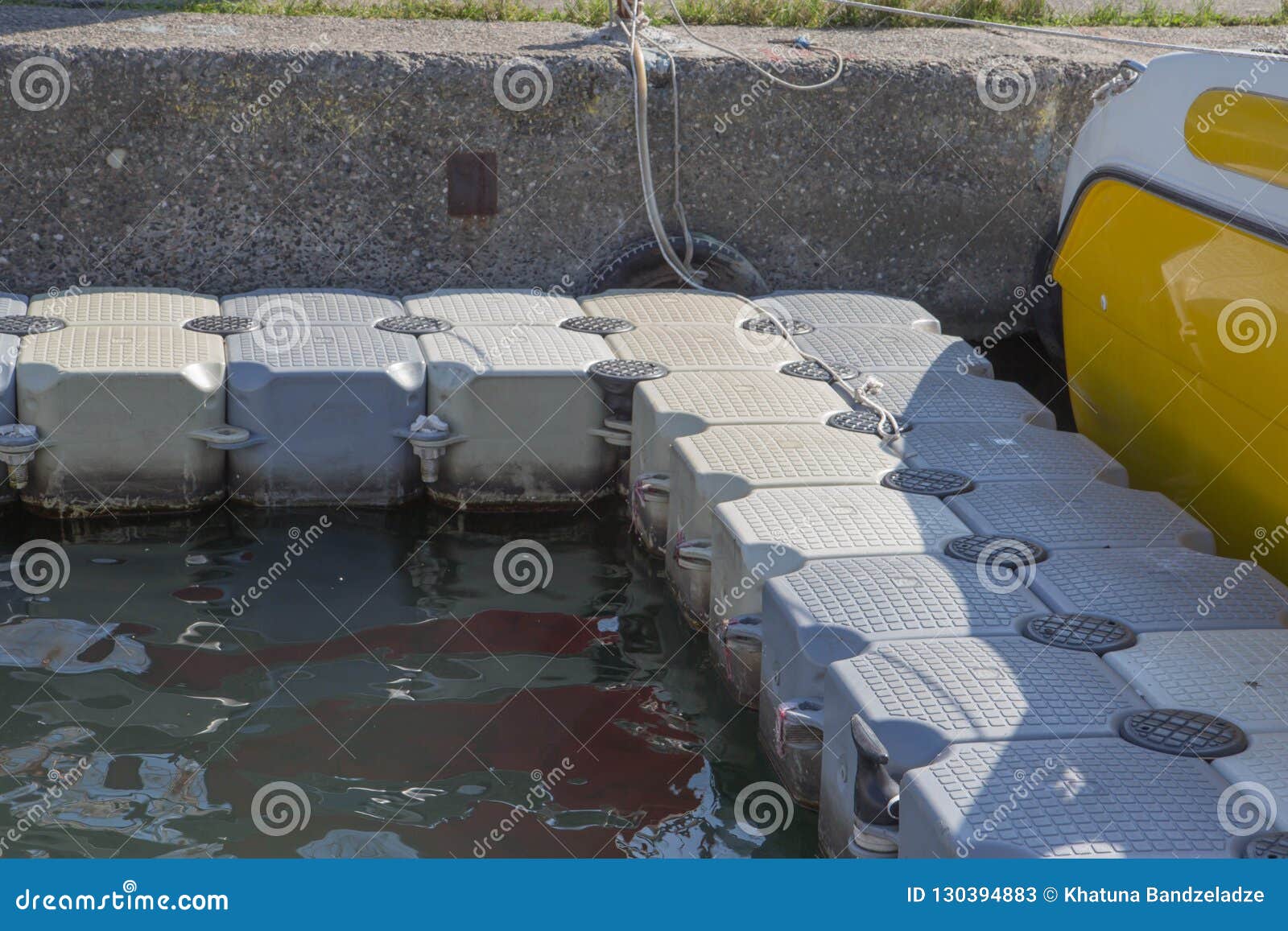 Plastic Floating Dock, Plastic Pontoon Cubes in the Sea in Sunny Day ...