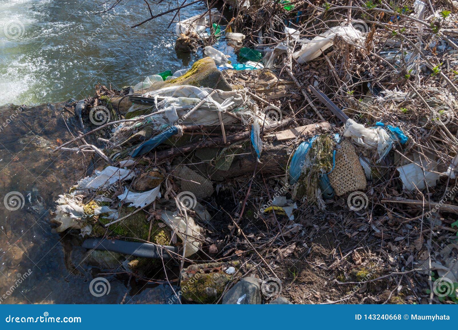 Plastic and Foam Garbage Floating on the Surface of the River Stock ...