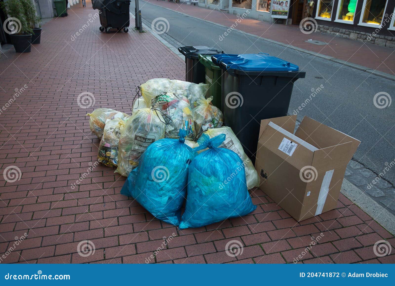 Plastic Garbage Bags and Bins on Sidewalk Editorial Photography - Image ...