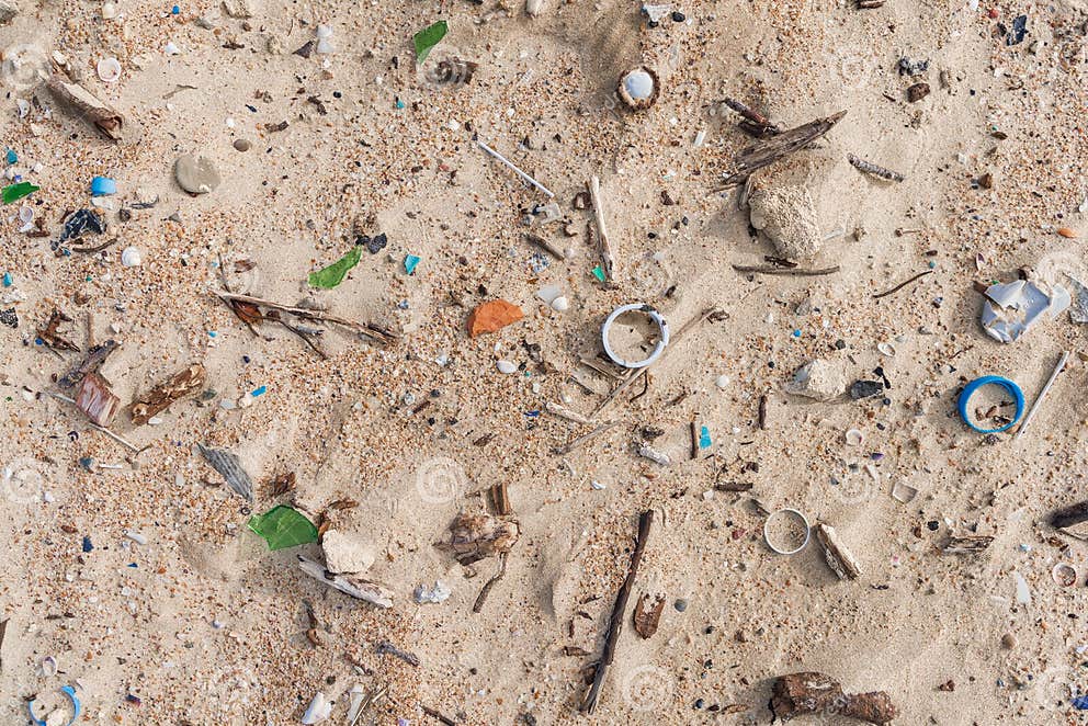 Plastic Garbage in Sand on Beach. Pollution by Microplastic Rubbish on ...