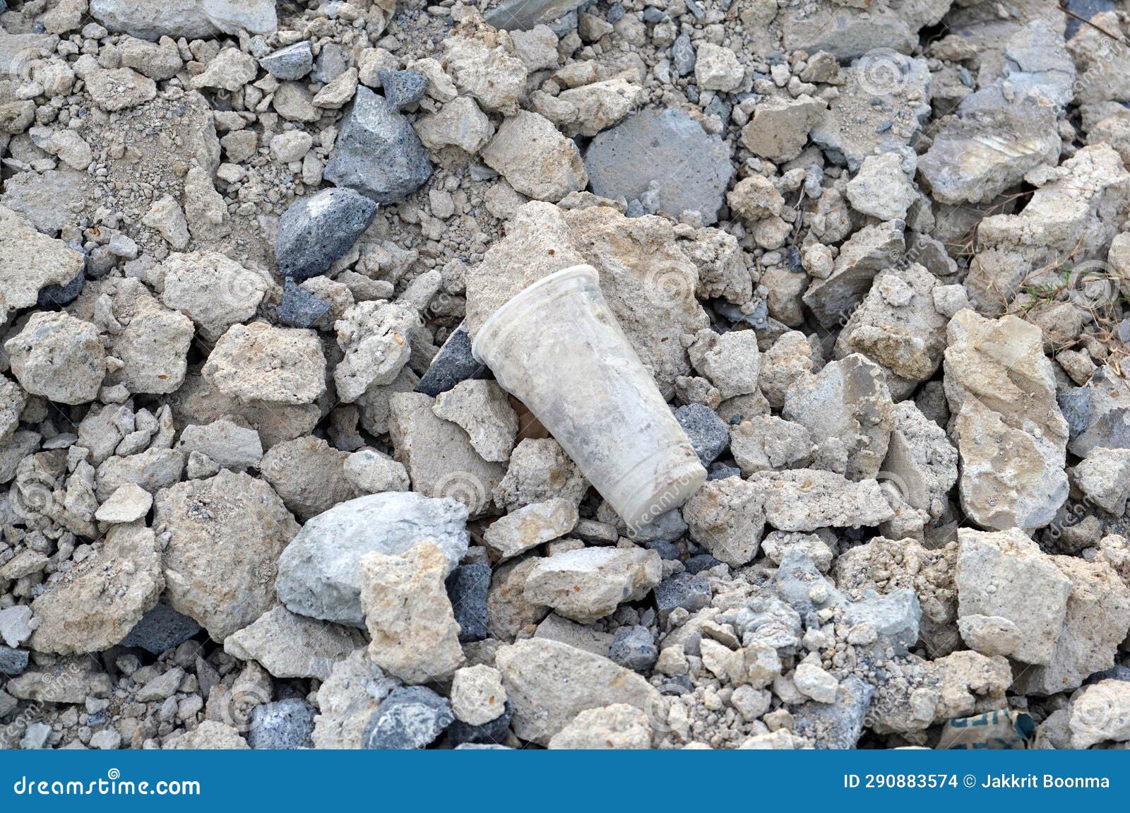 A Plastic Glass Waste on a Construction Scraps on the Construction Site ...