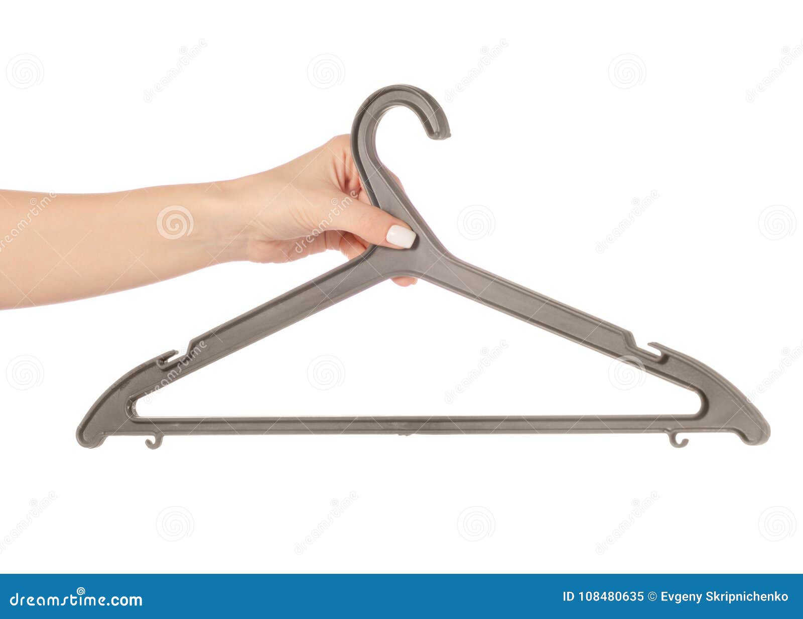 Plastic hanger in hand stock image. Image of design - 108480635