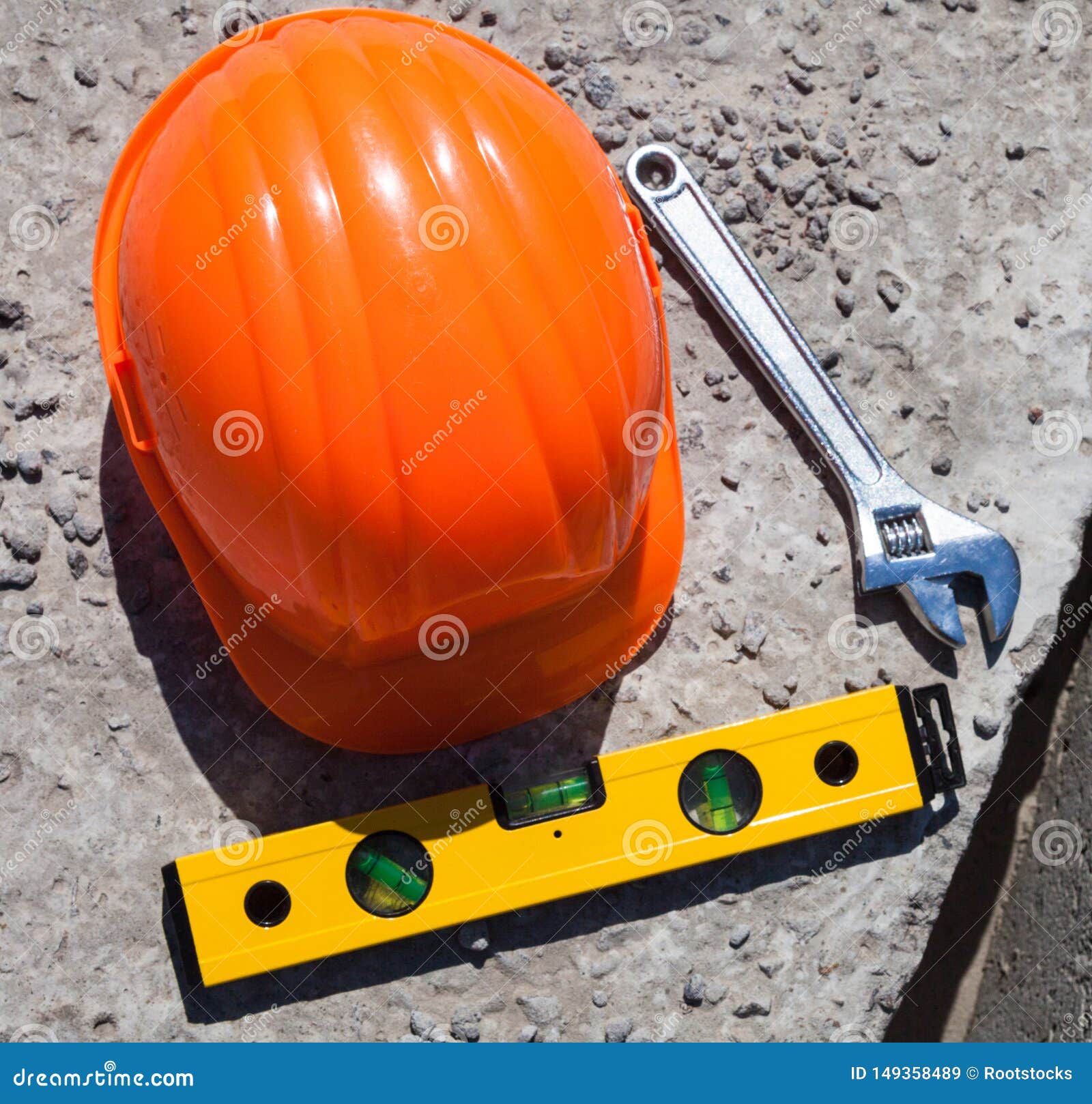 Plastic Hardhat, Spirit Level and Adjustable Spanner Stock Image ...