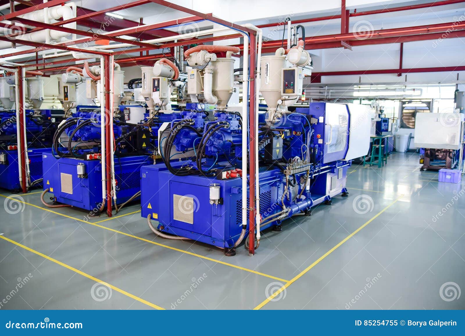 Plastic injection machines stock image. Image of iron - 85254755