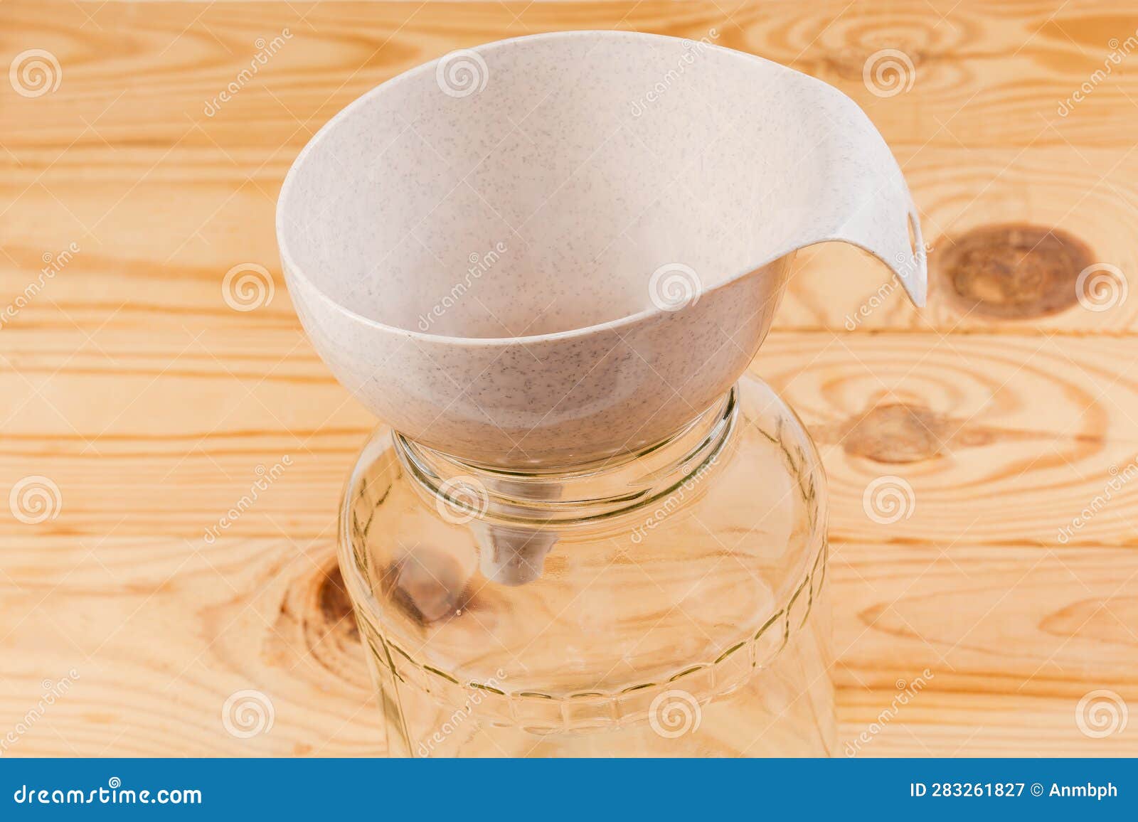 Plastic Kitchen Funnel on the Glass Jar on Rustic Table Stock Image ...