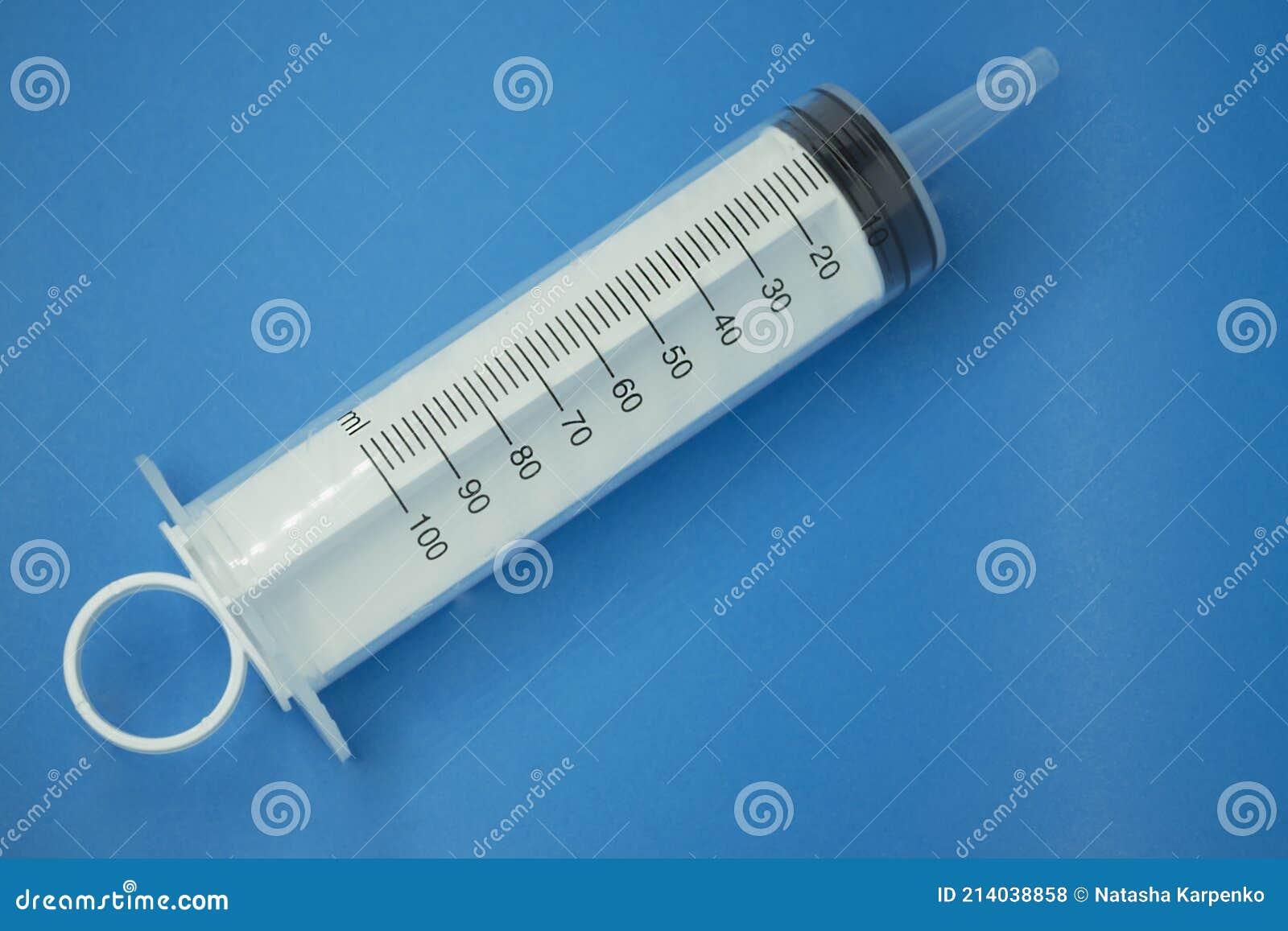 Plastic Large Syringe 100 Ml, on a Blue Background Stock Photo - Image ...
