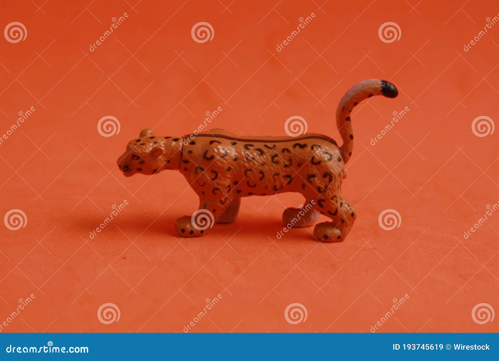 Plastic Leopard Toy on Orange Surface Stock Image - Image of africa ...