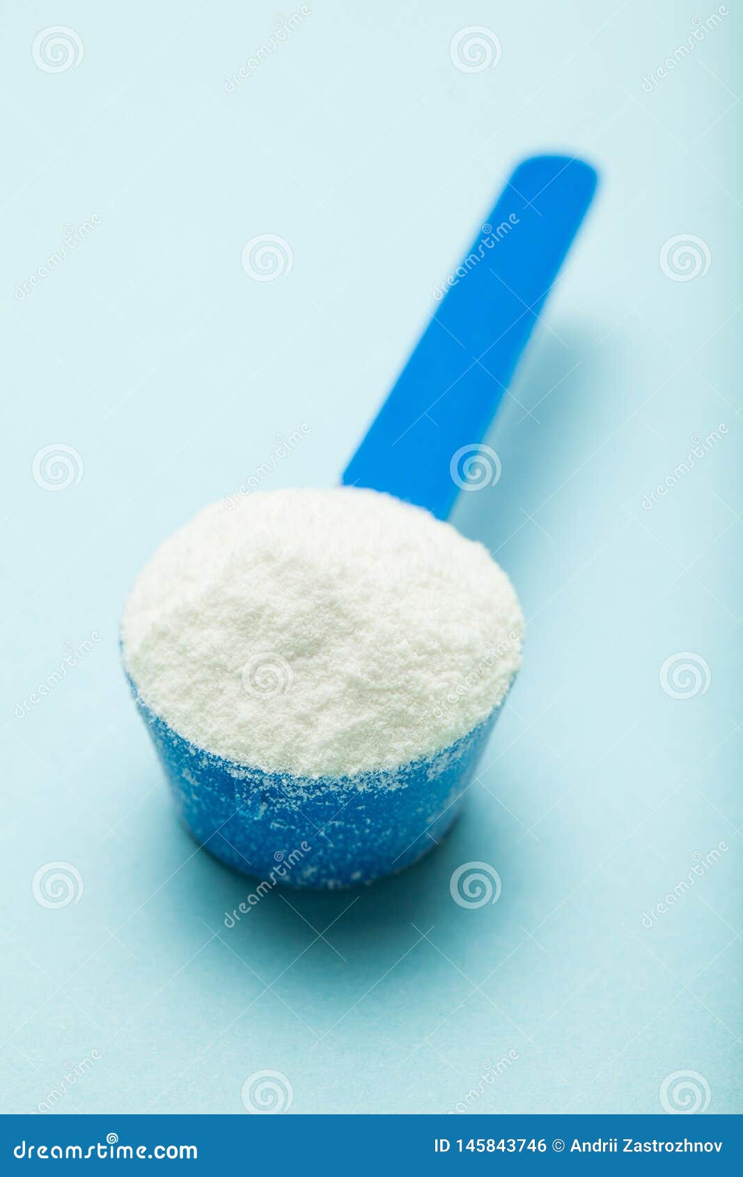 Plastic Measuring Spoon with Milk Powder, Close-up Stock Photo - Image ...