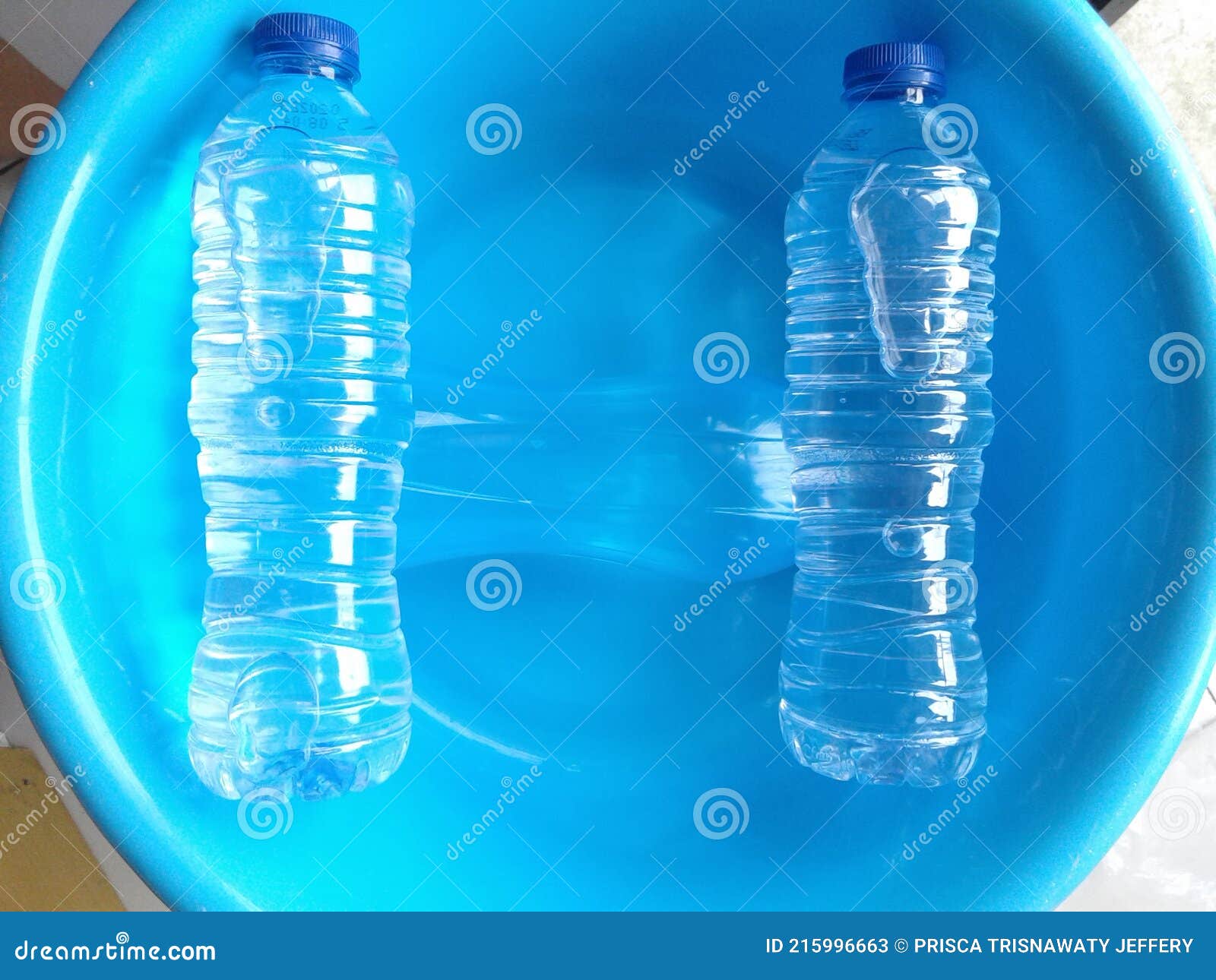 Plastic Mineral Water Bottles in a Blue Container Stock Image - Image ...