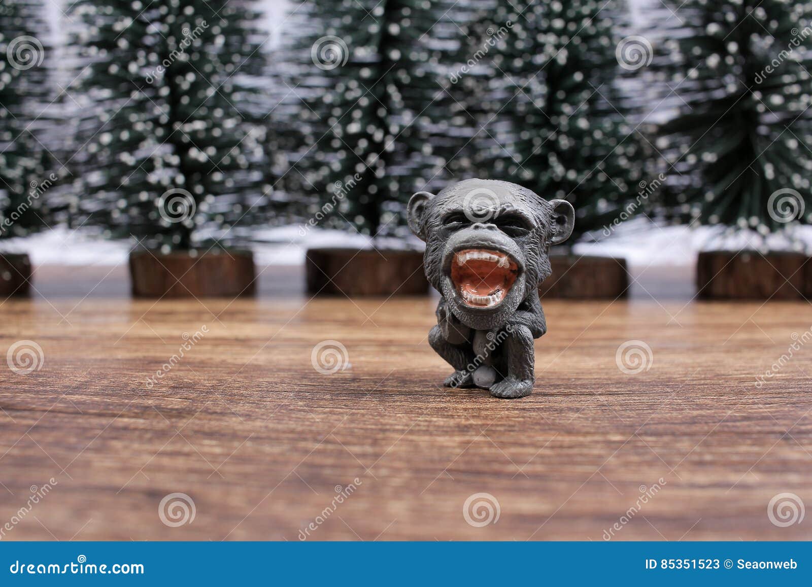 Plastic Monkey Toy with Trees Stock Image - Image of plastic, sitting ...