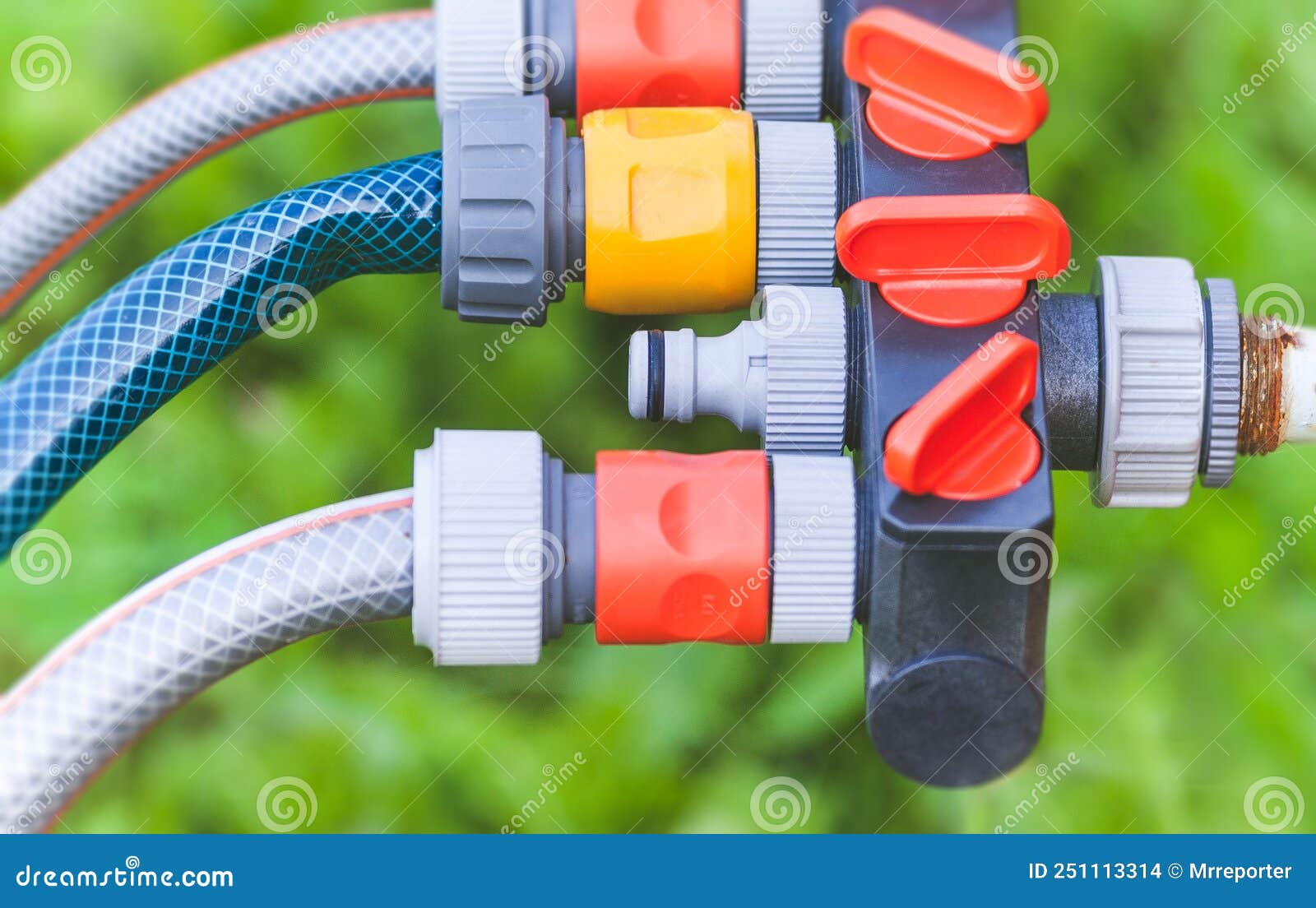 Plastic Multi-channel Supply Water Fitting for Garden Hoses Stock Photo ...