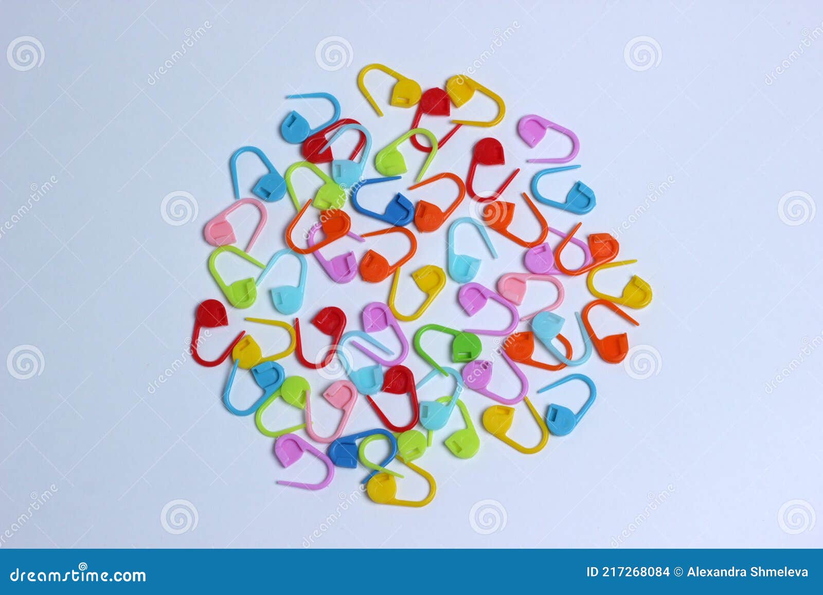 Plastic Multi-colored Knitting Pins. Colorful Pins on the White ...