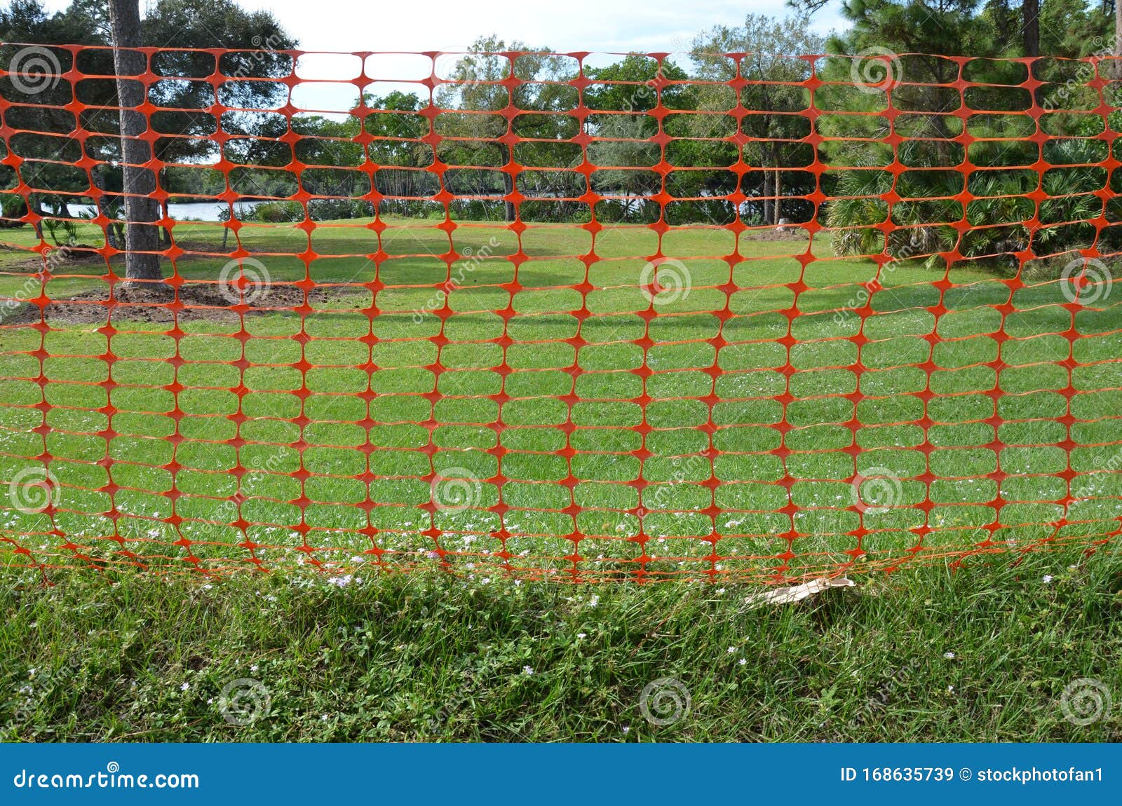 Plastic Orange Net or Fence and Green Grass Stock Image - Image of yard ...