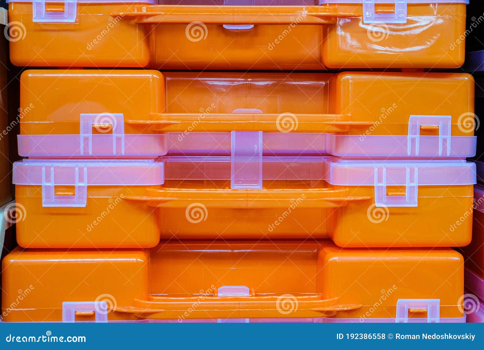 Plastic Orange Tool Boxes on Store Shelves. Stack of Organizers Close ...