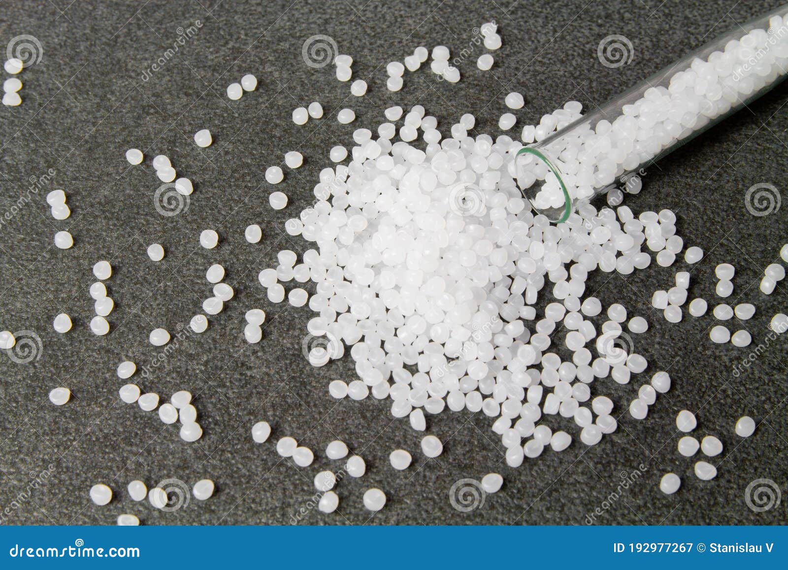 Plastic Pallets. White Polyethylene Granules on a Stone Background ...