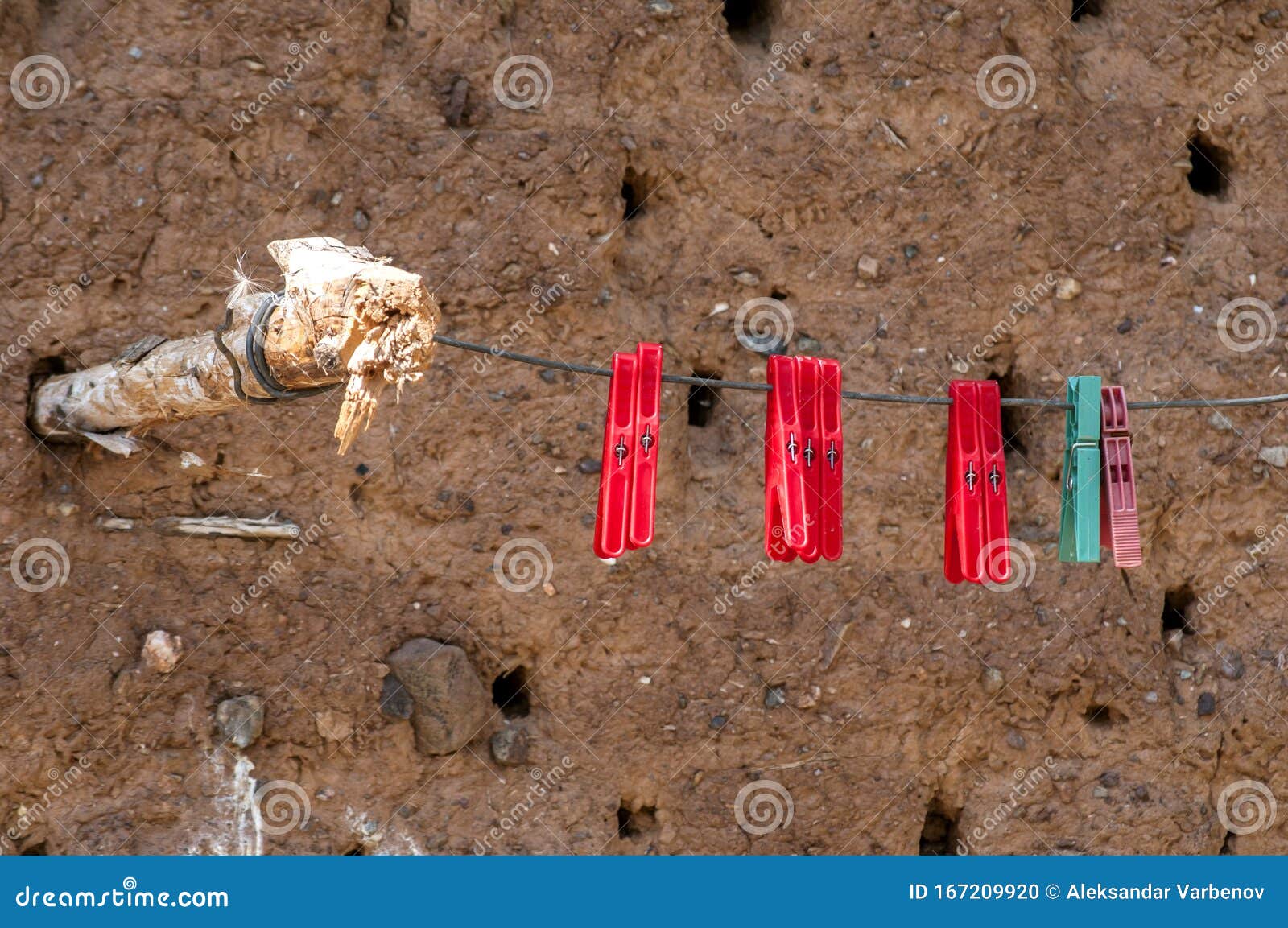 Plastic pegs on string stock photo. Image of clothesline - 167209920