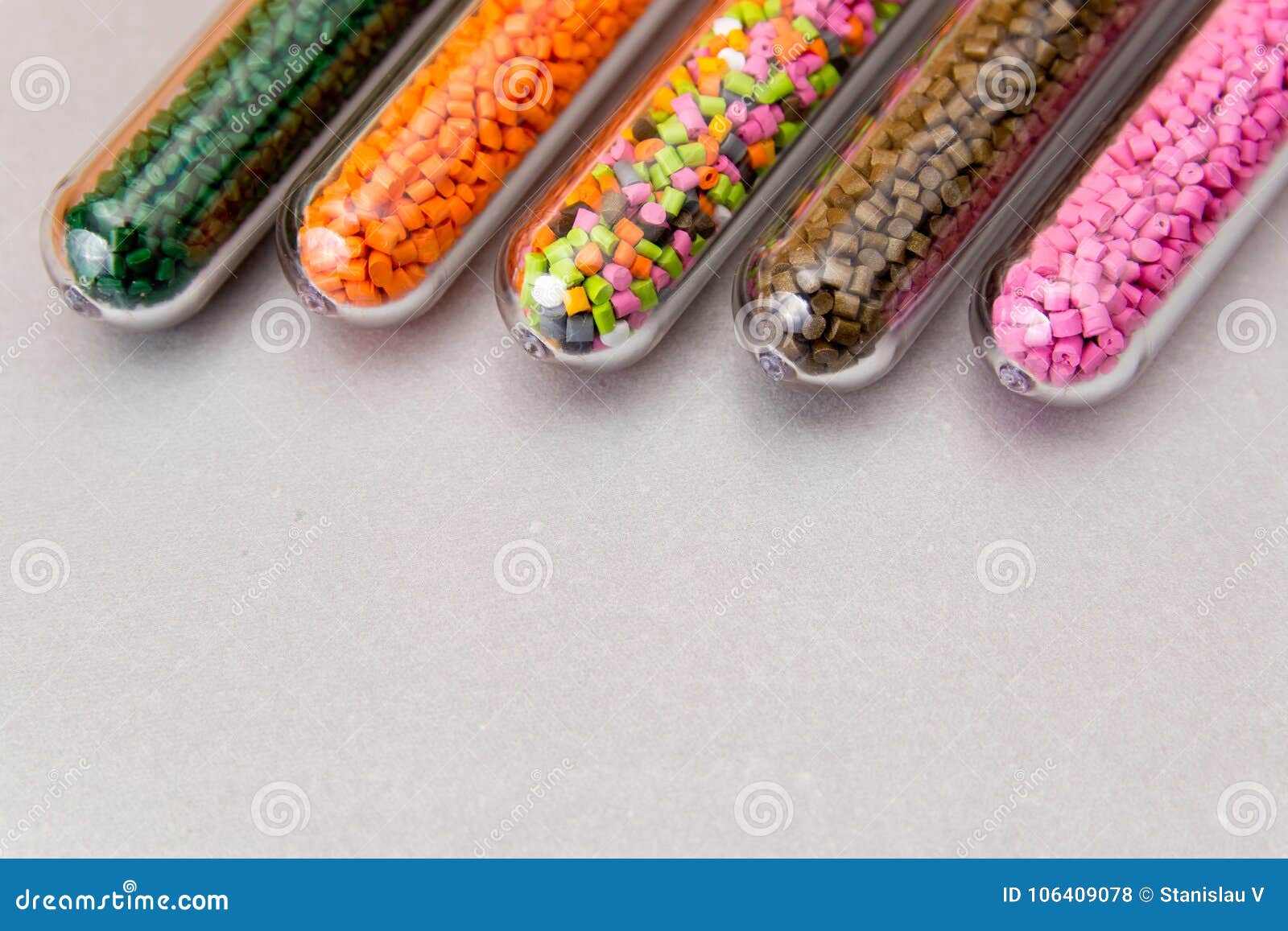 Plastic Pellets .Polymeric Dye in Test Tubes on Gray Background Stock ...
