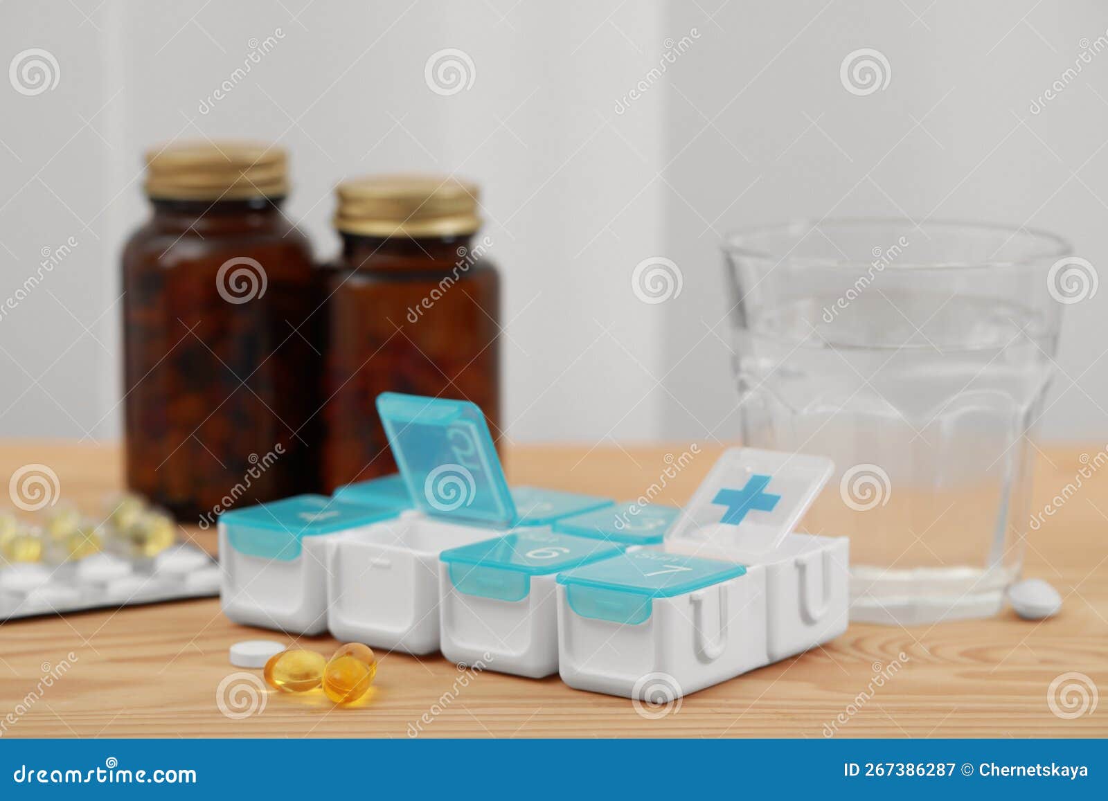 Plastic Pill Box and Different Medicaments on Wooden Table Stock Image ...