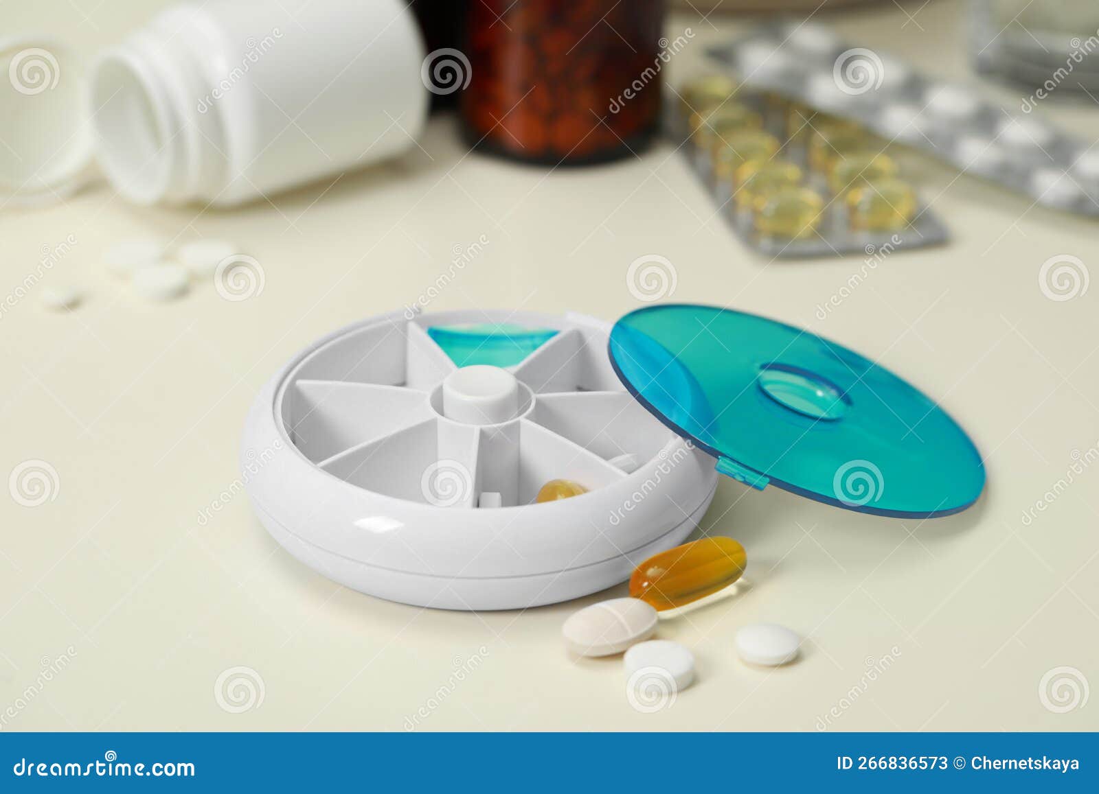 Plastic Pill Box and Different Medicaments on White Table, Closeup ...