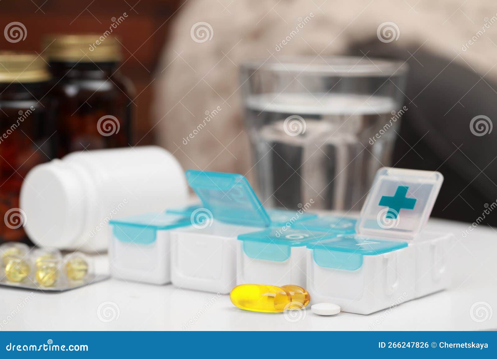 Plastic Pill Box with Different Medicaments on Table Stock Photo ...