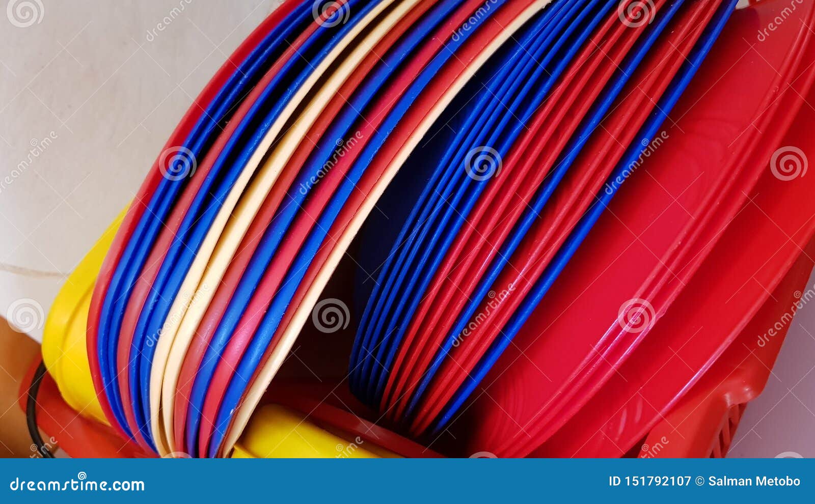 Plastic Plates in Different Colors Stack Together Stock Image - Image ...