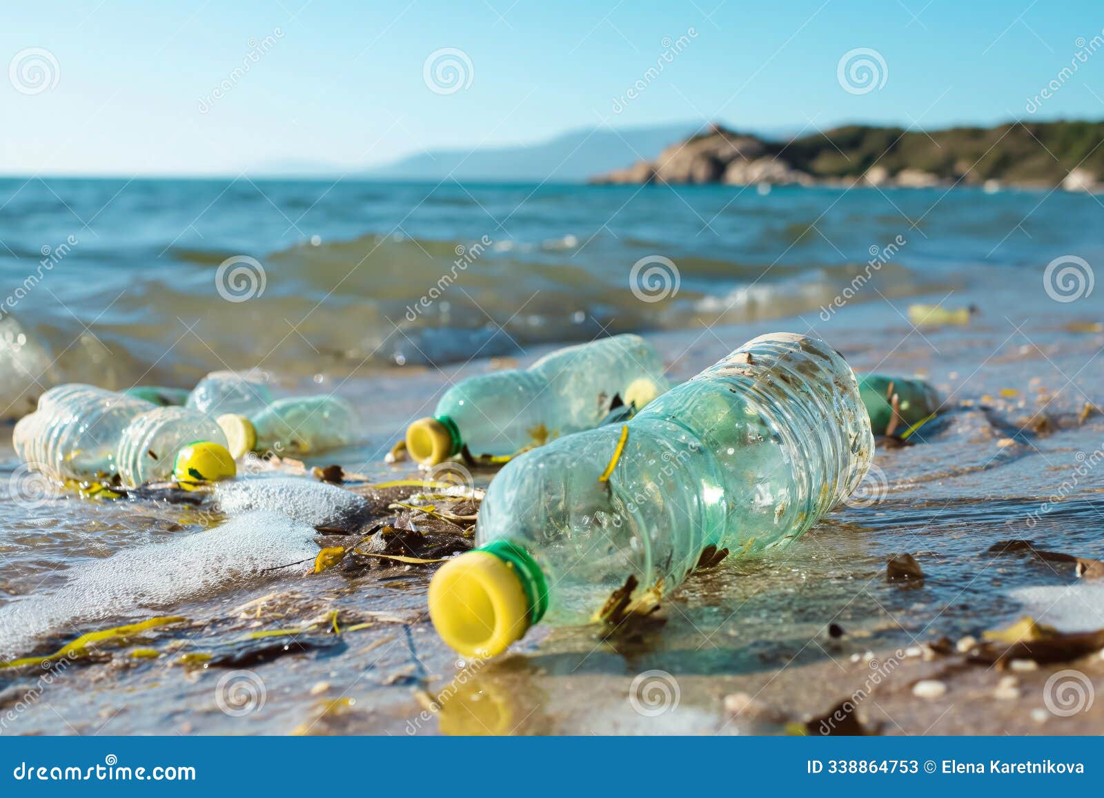 Plastic Pollution on a Beach with Multiple Discarded Bottles Washed Up on the Shore. Stock Image ...