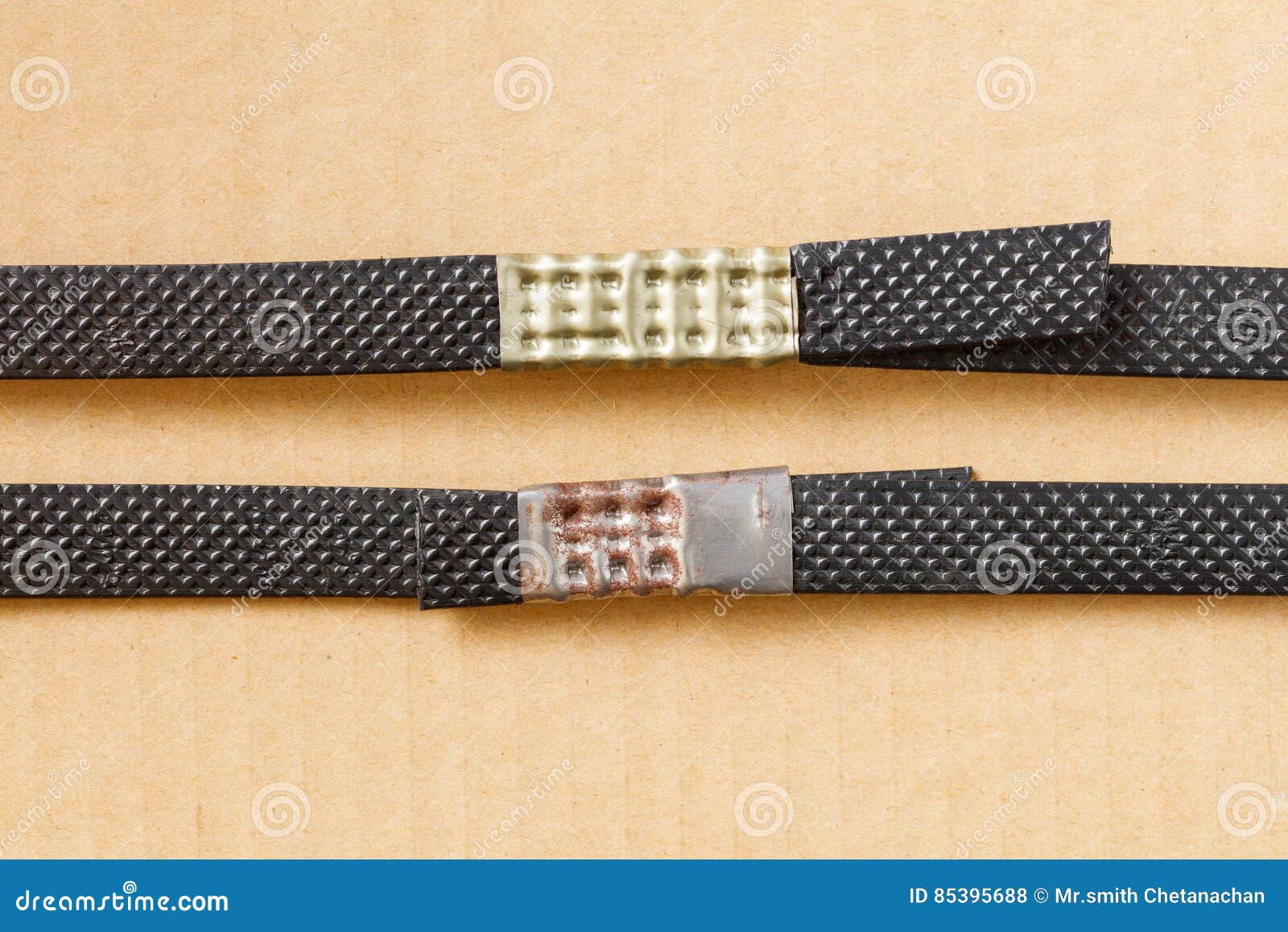 Plastic Poly Strap with Metal Clamp Stock Photo - Image of paper ...