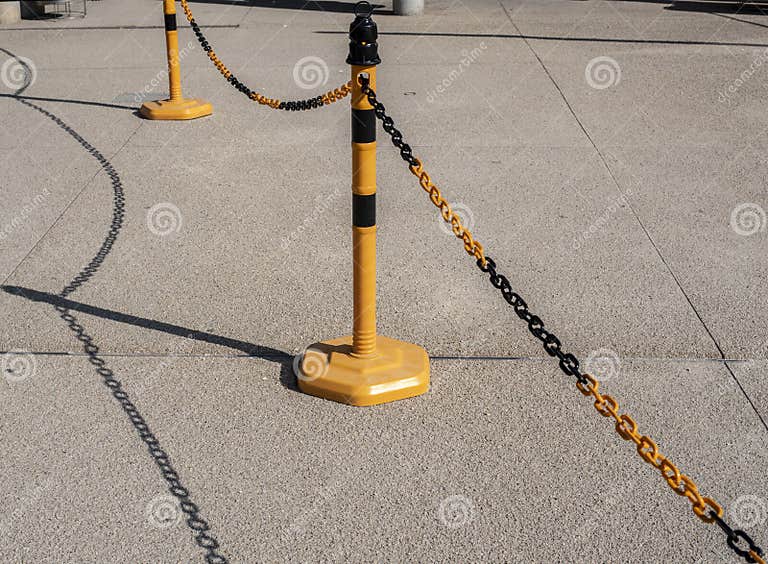 Plastic Post with Chain As Safety Barrier Stock Image - Image of ...