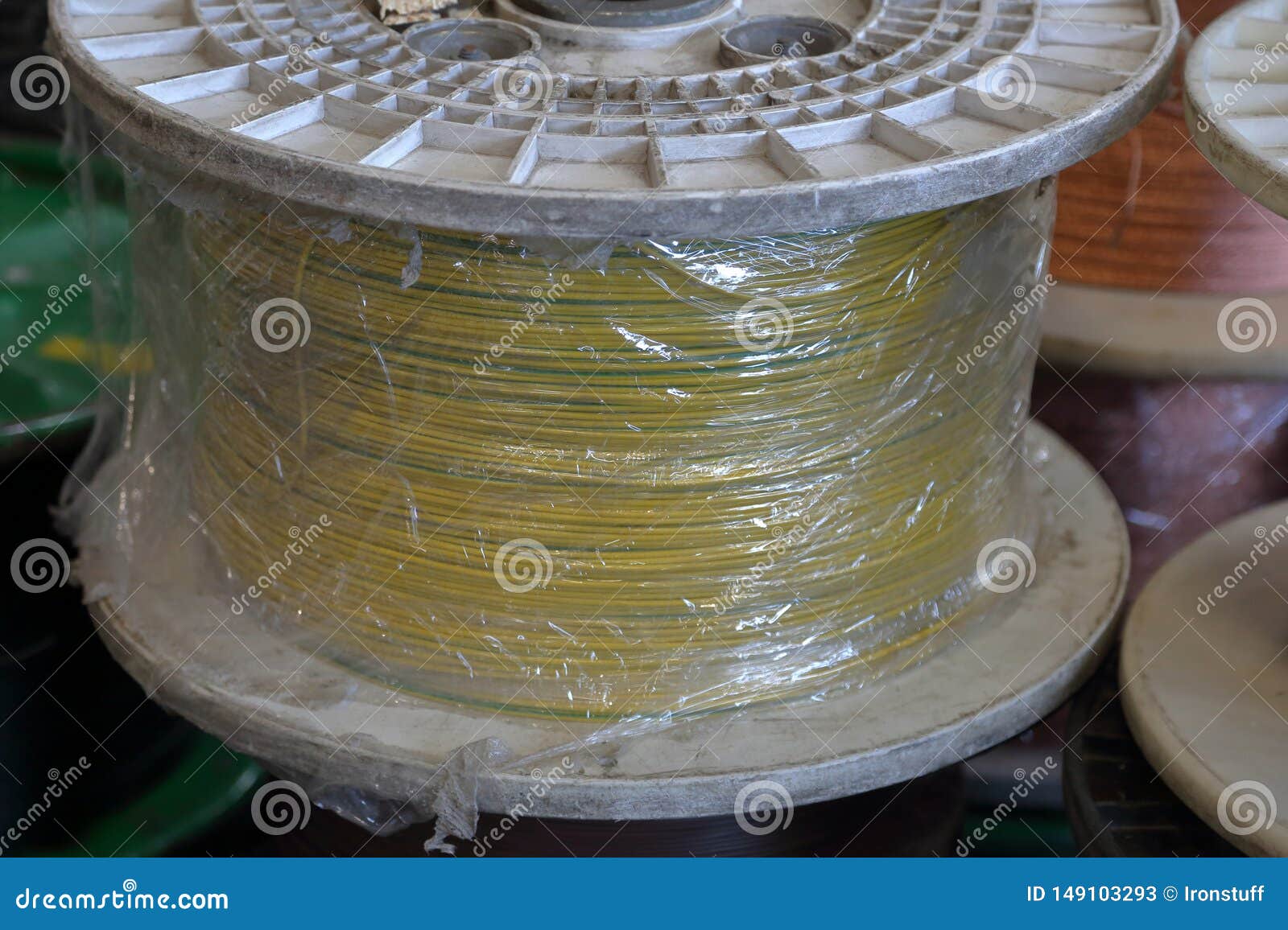 Plastic reels with cable stock image. Image of roll - 149103293