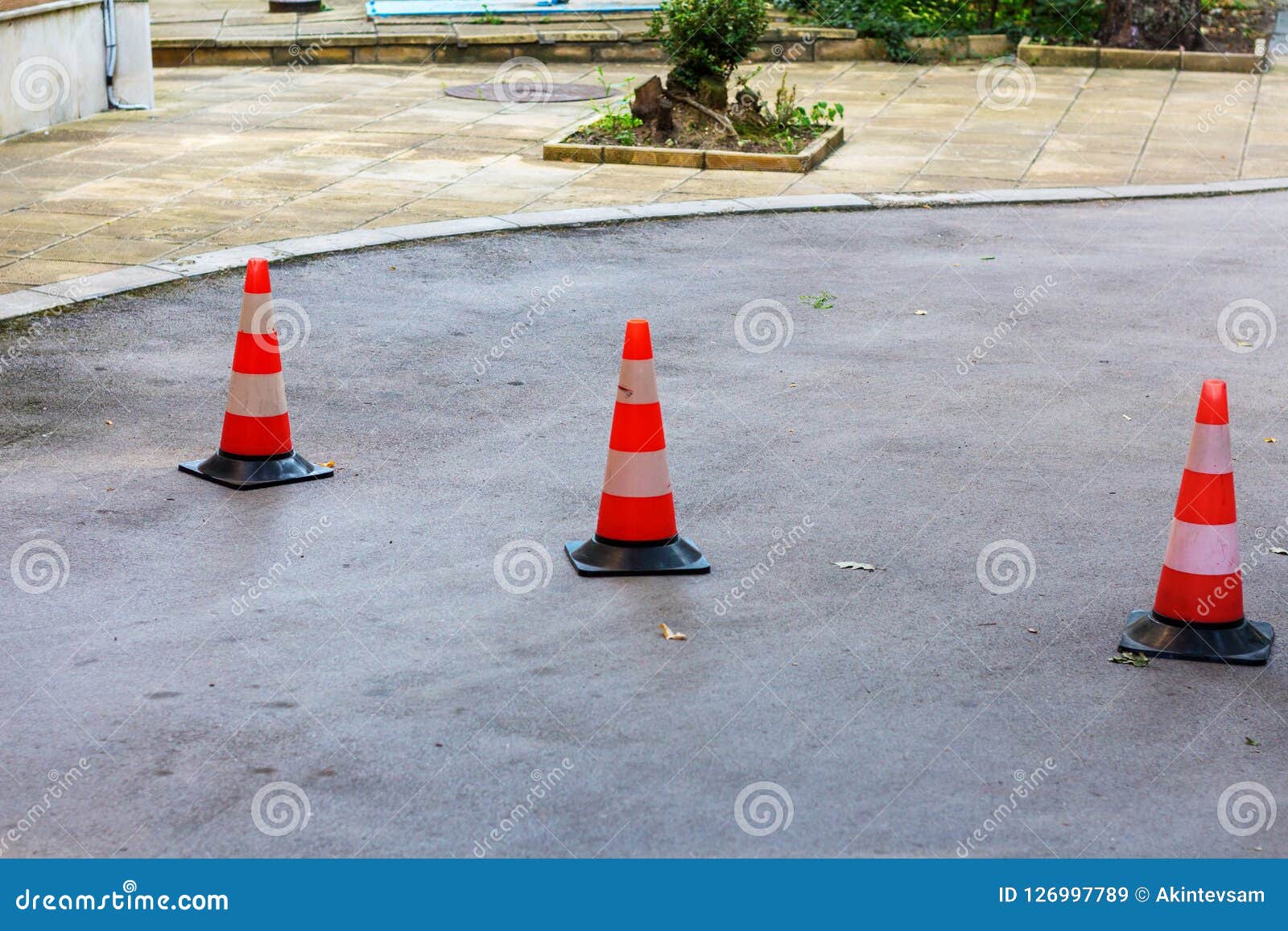 Three Road Cones Overlapping the Entrance Stock Image - Image of cones ...