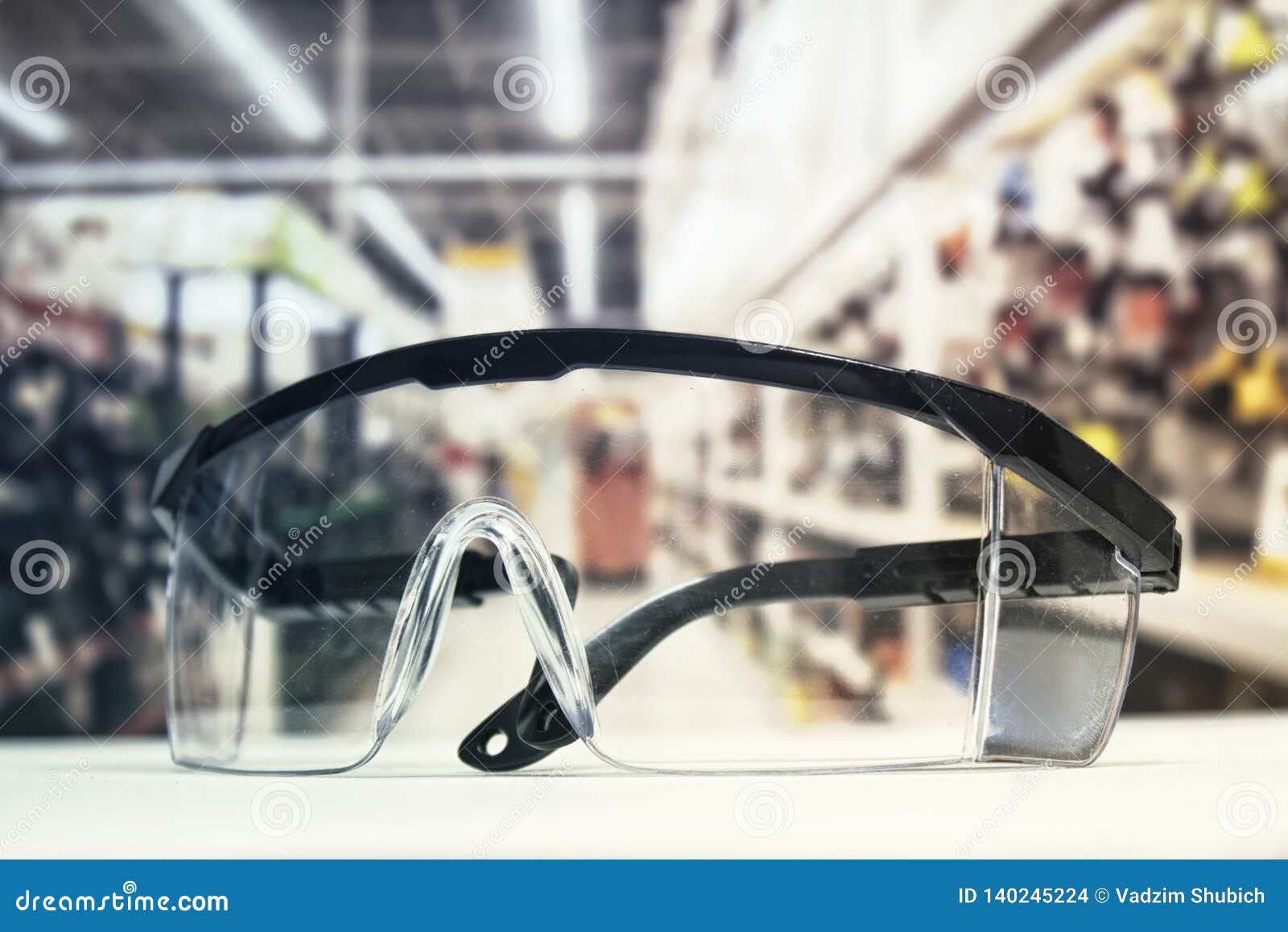 Plastic Safety Goggles, on the Table and Background of the Hardware ...