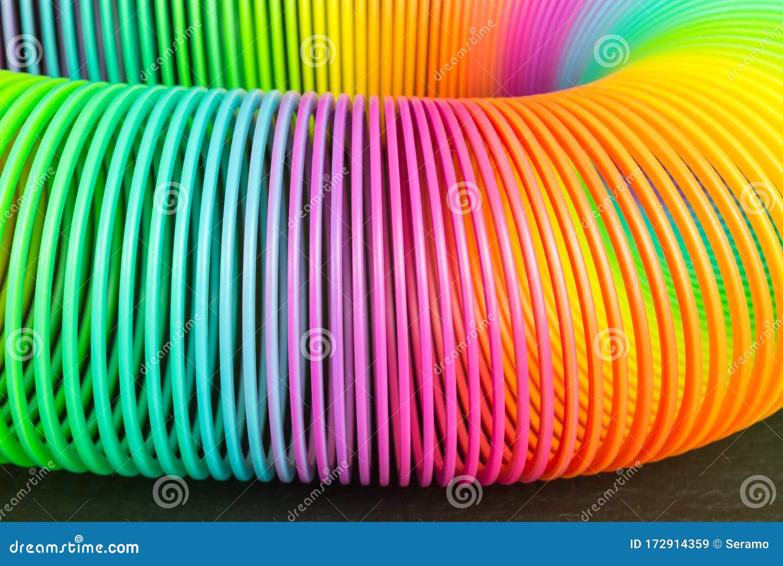 Plastic spring toy editorial stock image. Image of game - 172914359