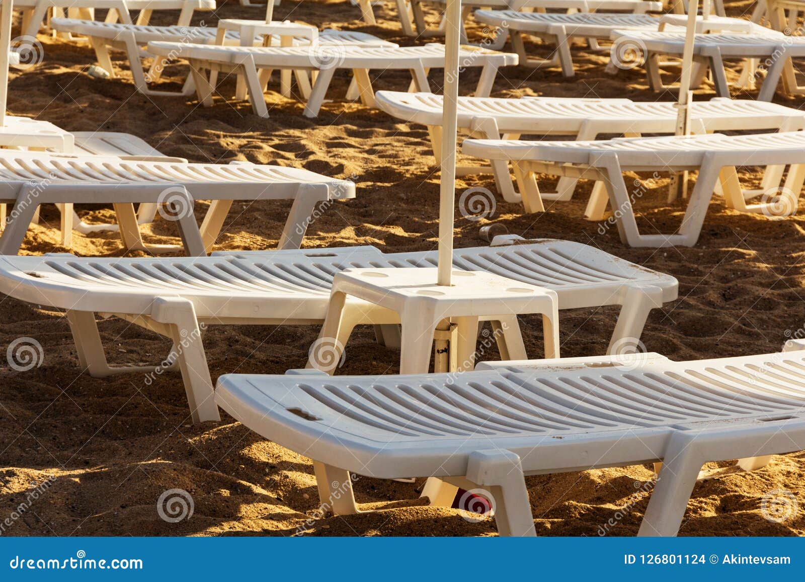 Plastic sun beds stock photo. Image of tropical, relax - 126801124