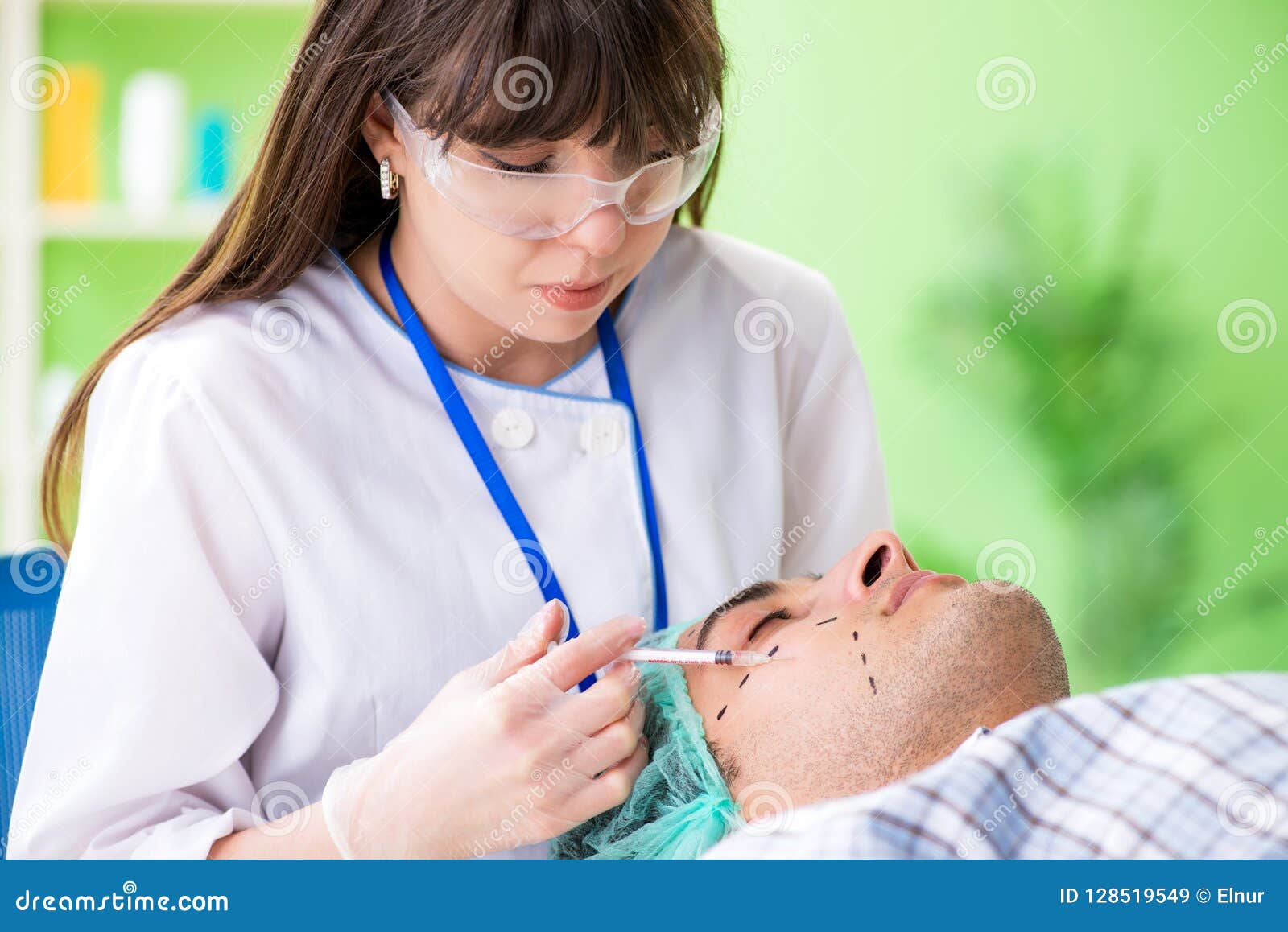 The Plastic Surgeon Preparing for Operation on Man Face Stock Image ...