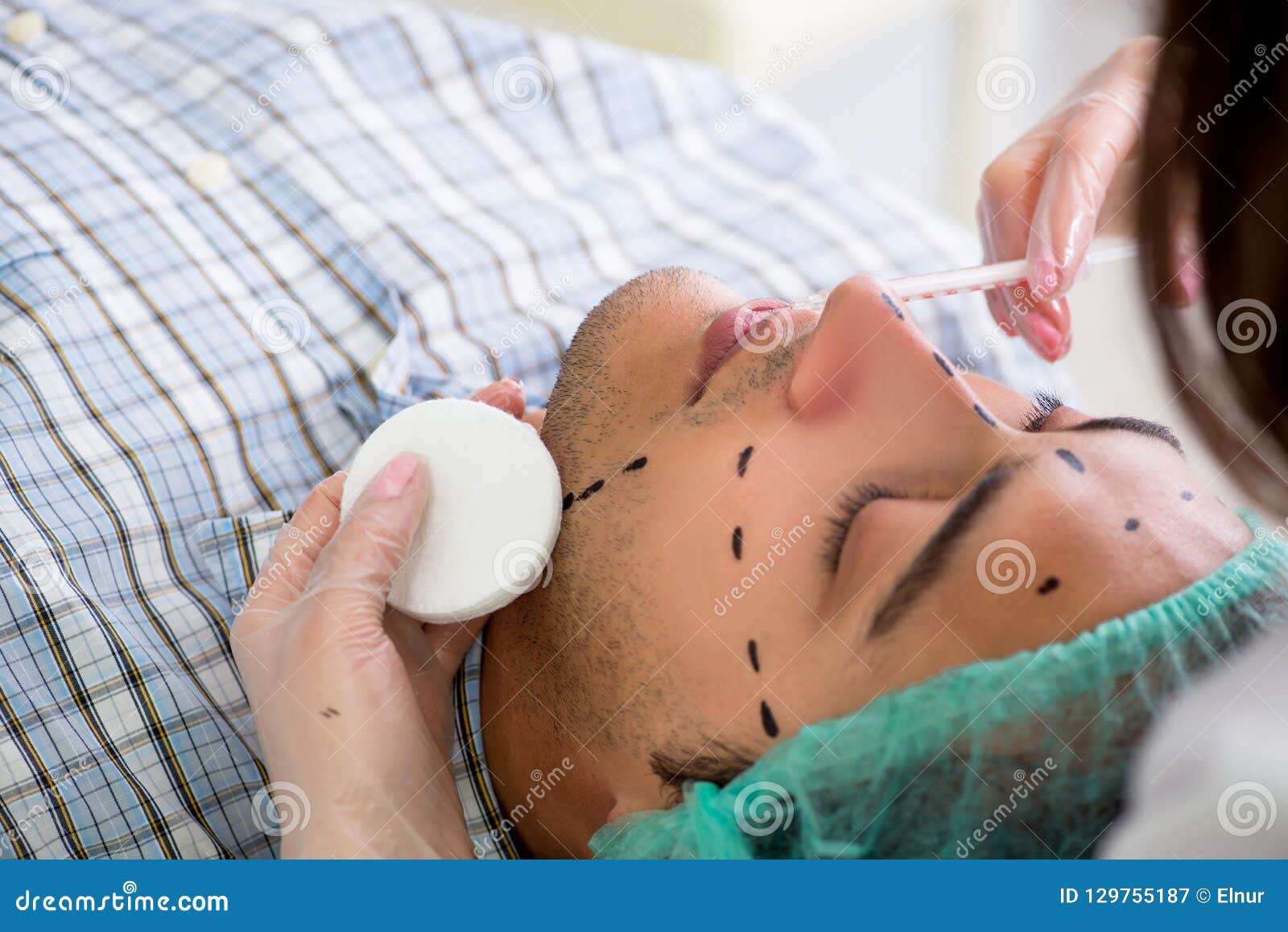 The Plastic Surgeon Preparing for Operation on Man Face Stock Image ...