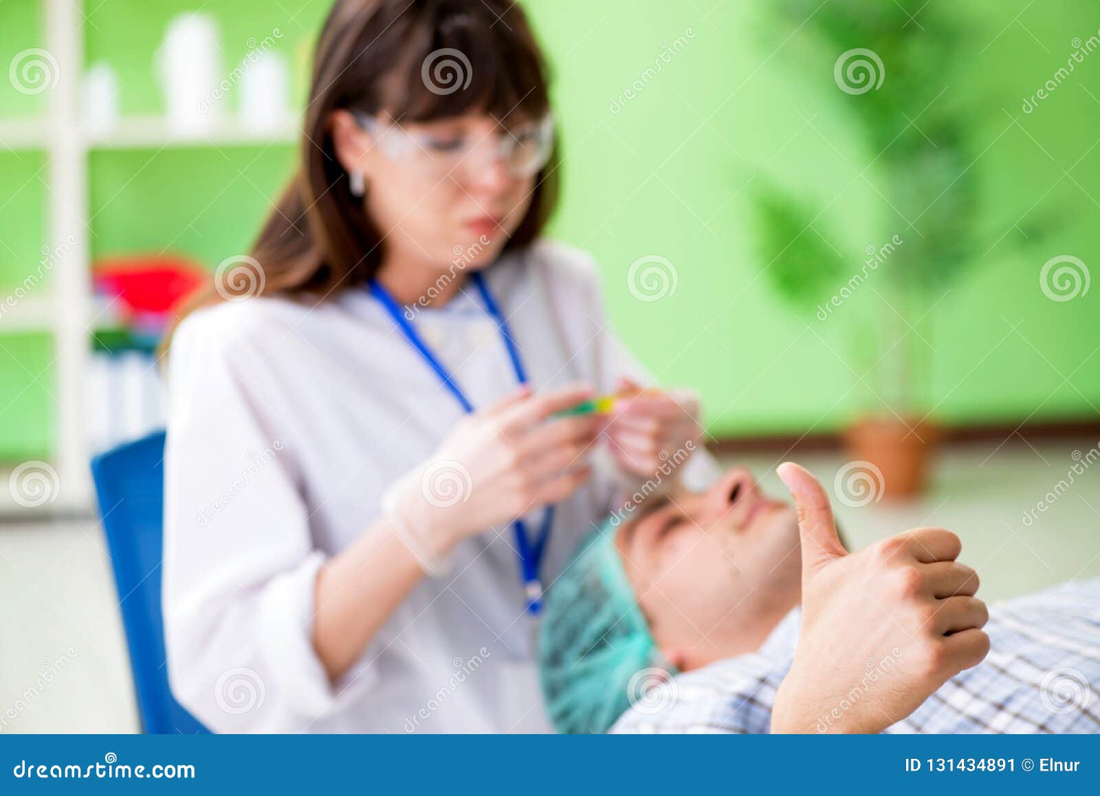The Plastic Surgeon Preparing for Operation on Man Face Stock Image ...