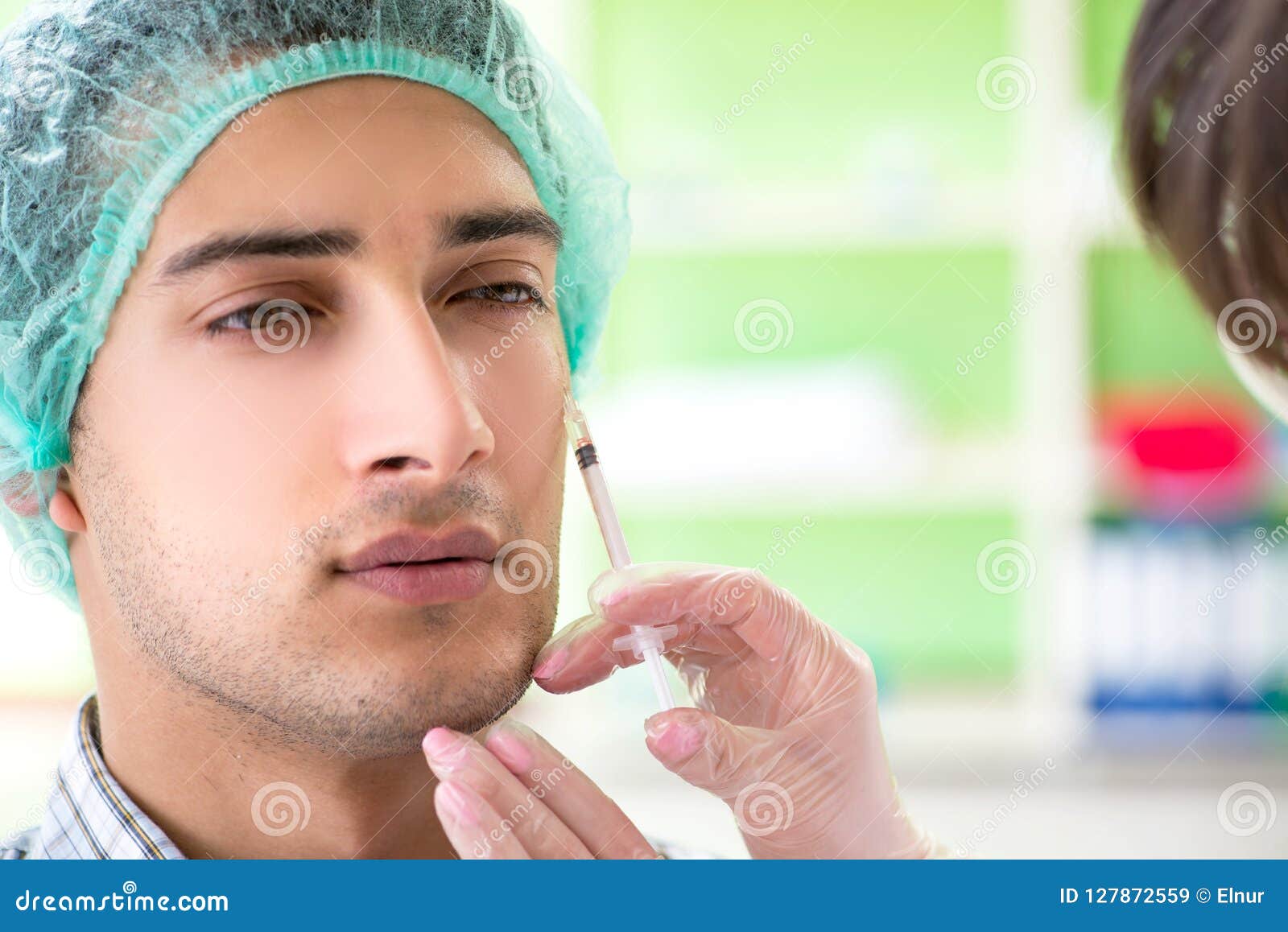 The Plastic Surgeon Preparing for Operation on Man Face Stock Image ...