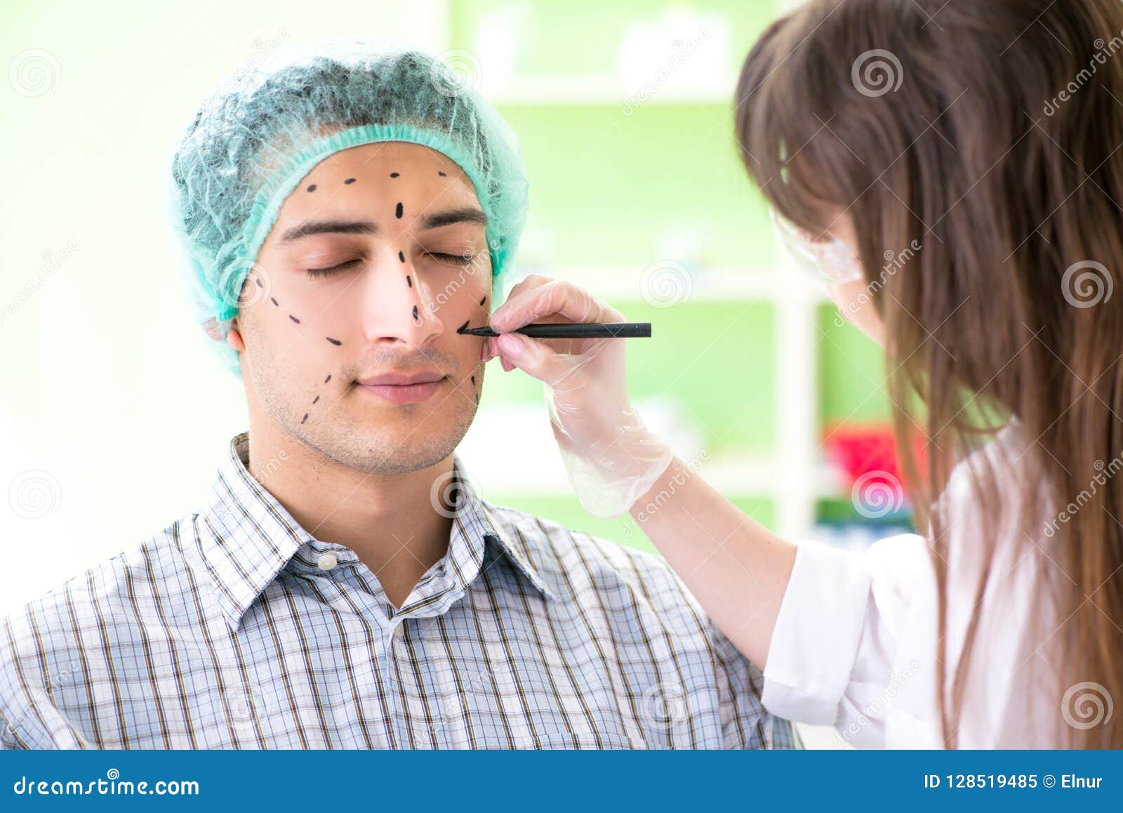 The Plastic Surgeon Preparing for Operation on Man Face Stock Image ...