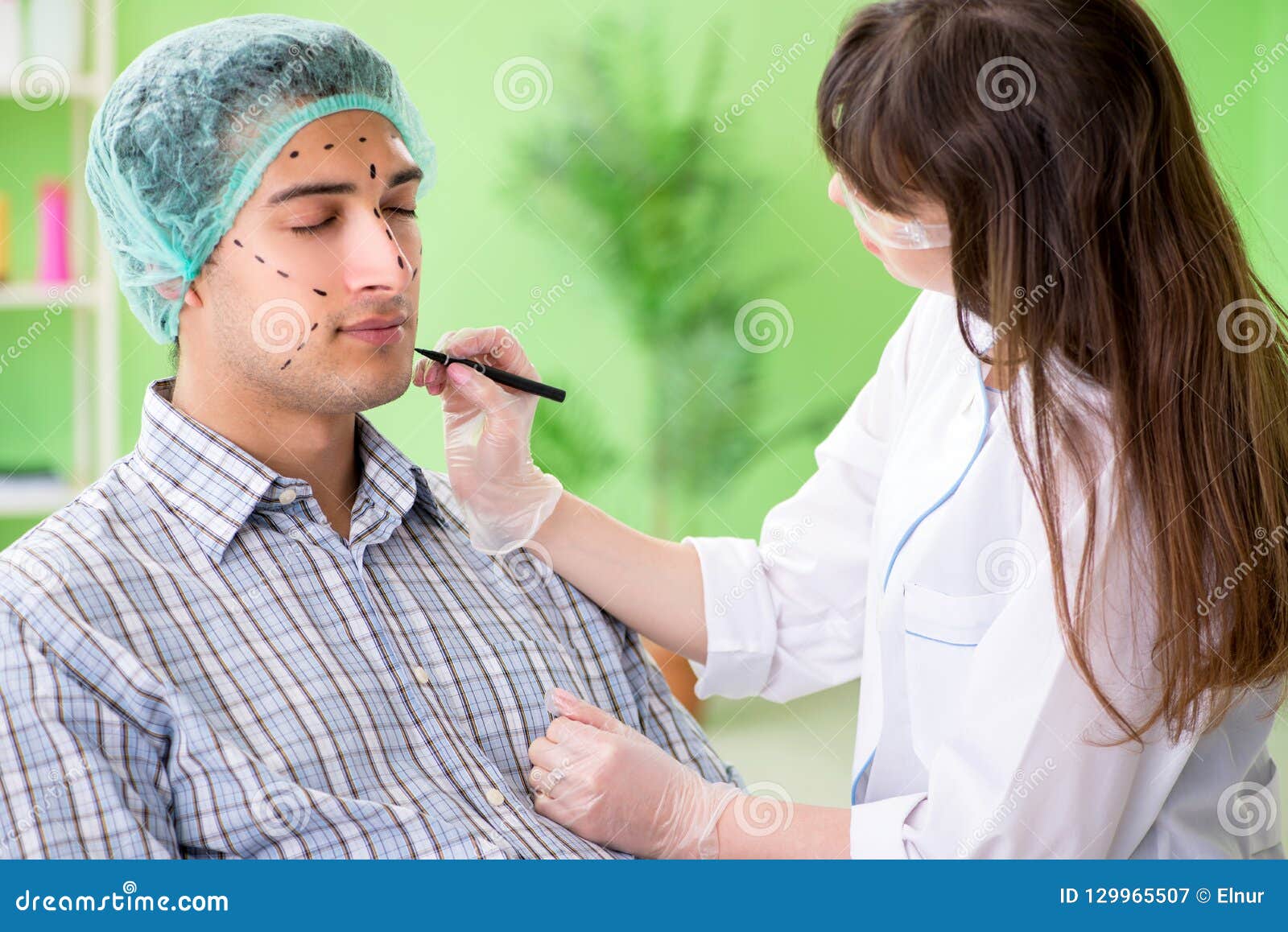 The Plastic Surgeon Preparing for Operation on Man Face Stock Image ...