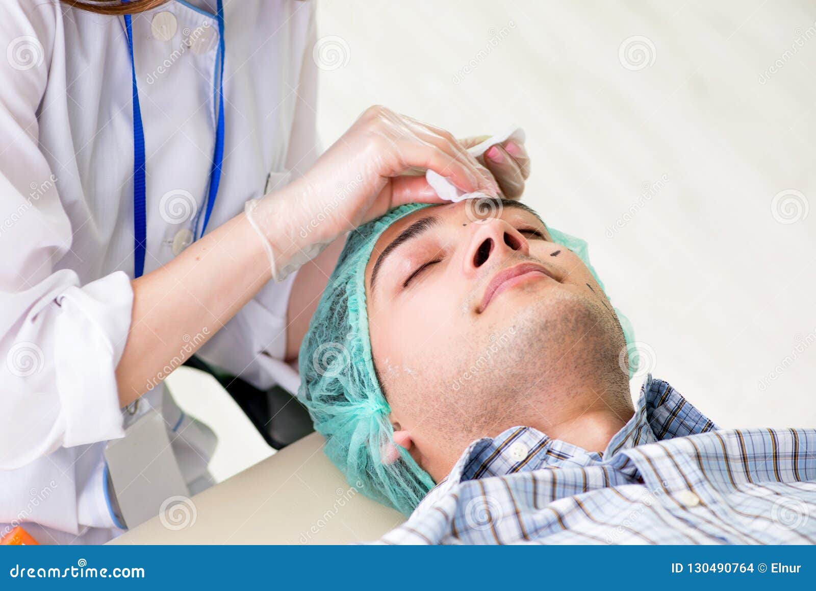 The Plastic Surgeon Preparing for Operation on Man Face Stock Photo ...