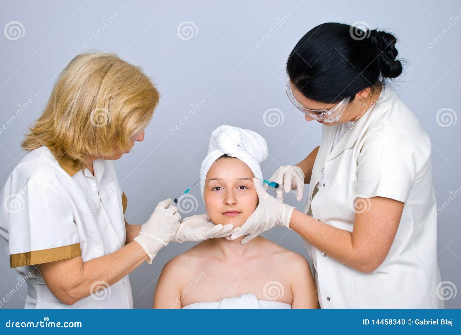 Plastic Surgeons Injecting Botox To a Woman Stock Photo - Image of ...