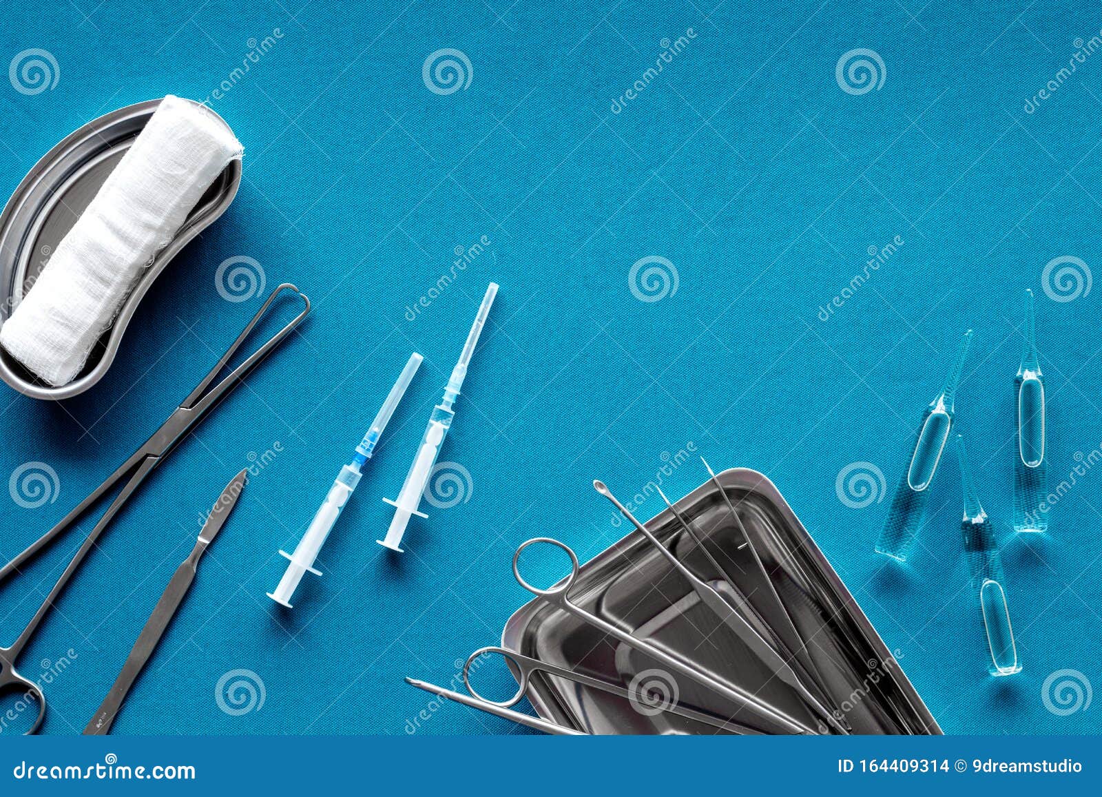 Plastic Surgery Instruments and Tools with Bandage on Blue Background ...